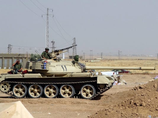 Sunni fighters expand offensive in western Iraq