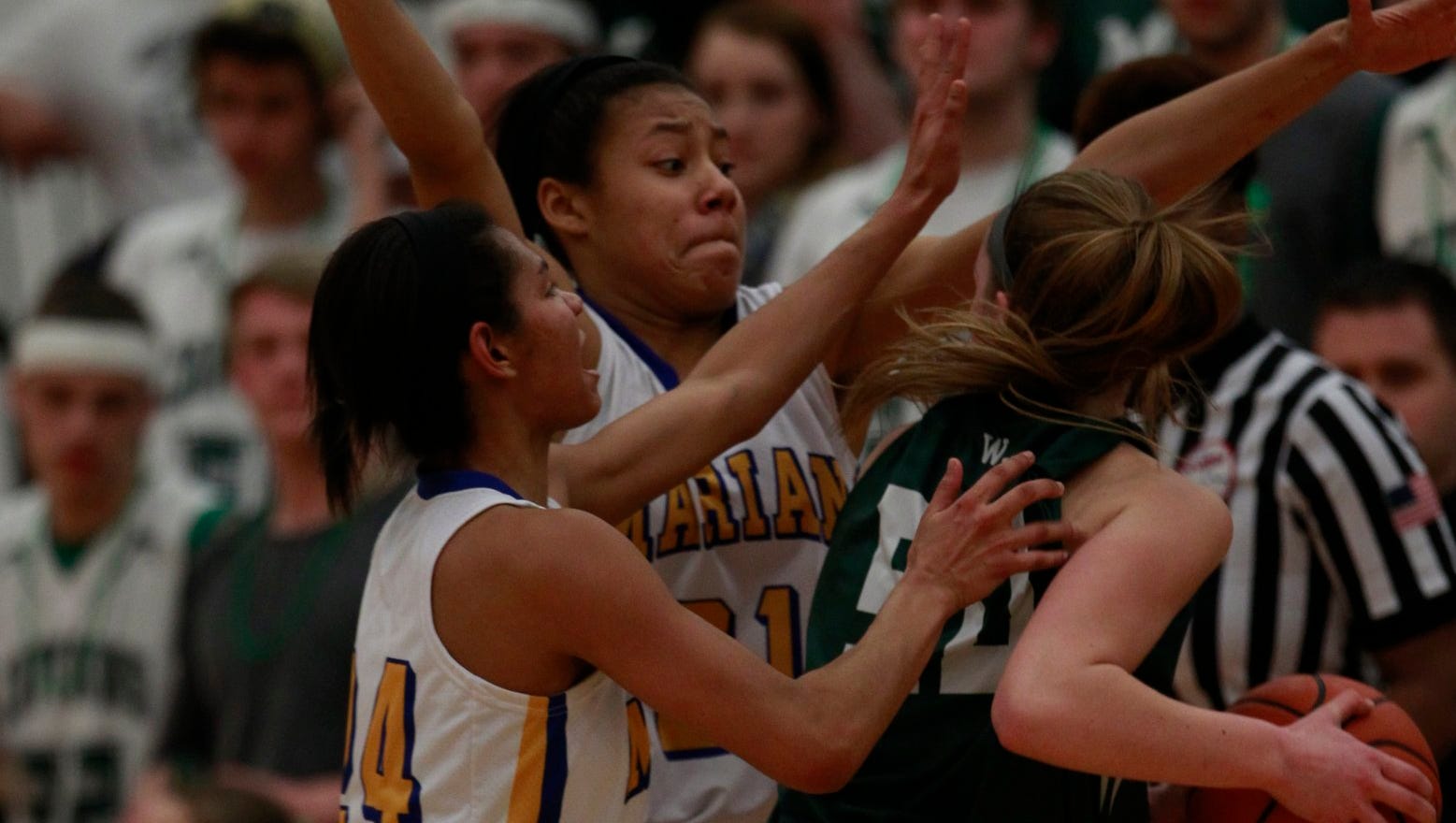 Marian 51, Kettering 42: Thomas leads Mustangs to win