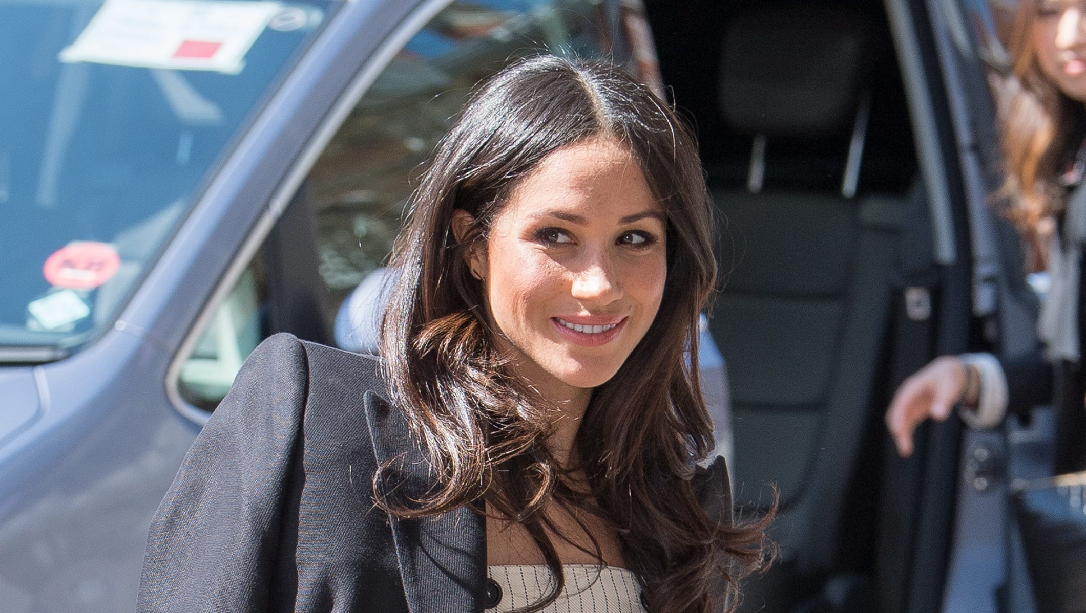 Meghan Markle is marvelous in white and pinstripes a month before her ...