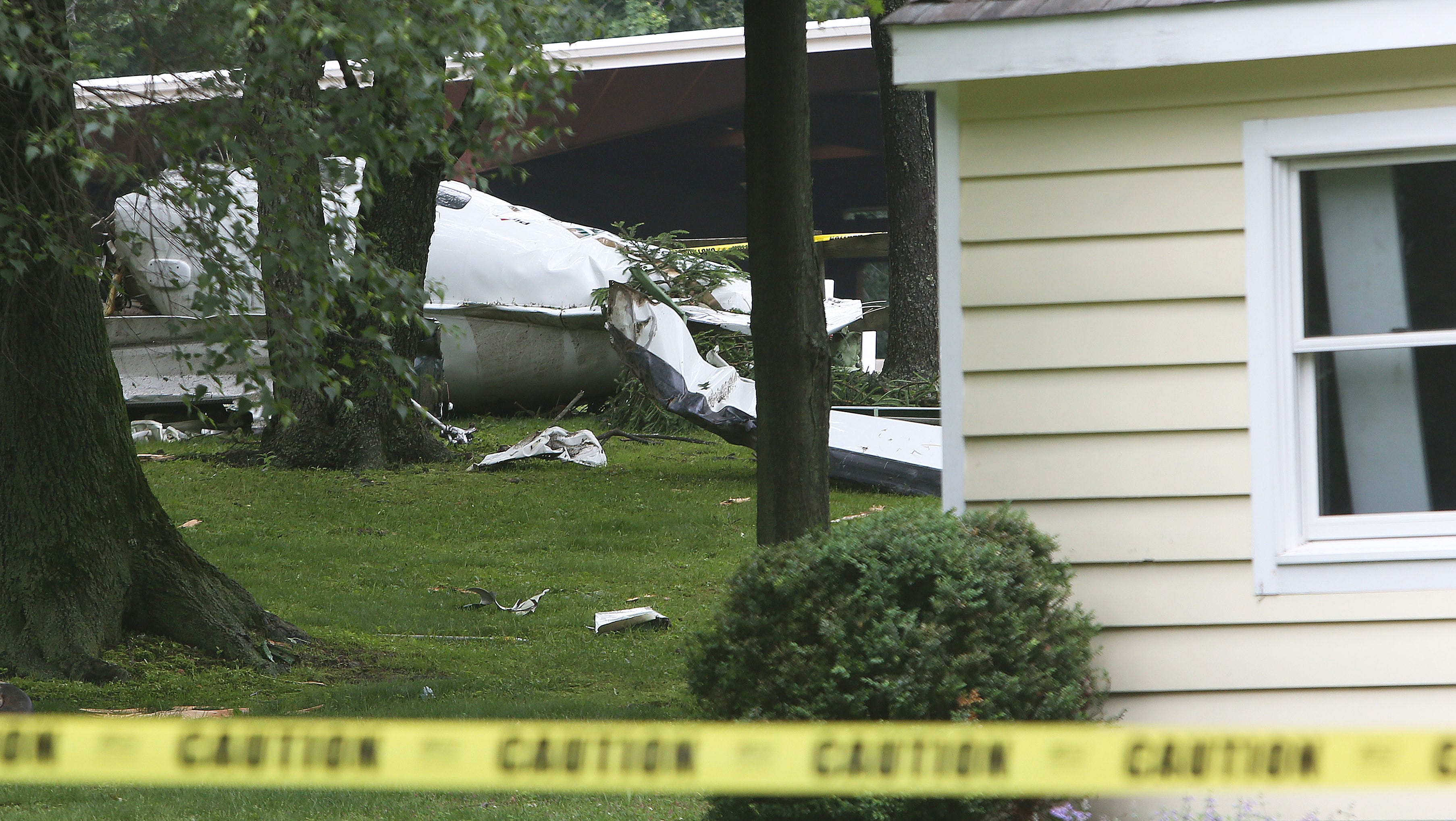 Probe continues into Rockefeller plane crash