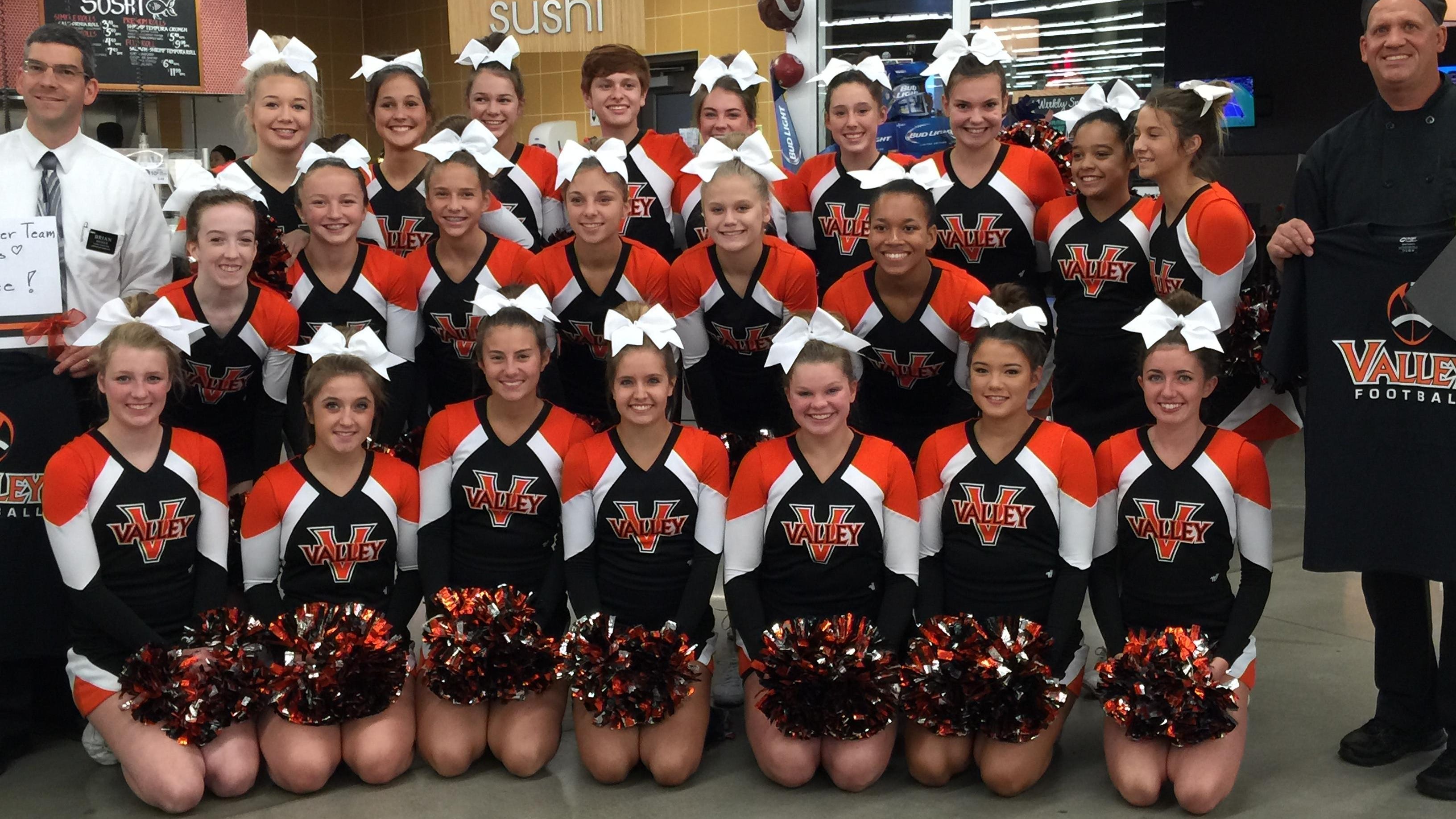 Valley cheerleaders thank Hy-Vee