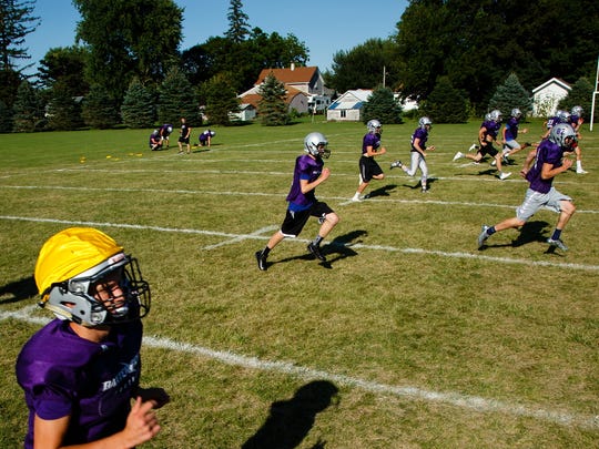 After CMB split, Baxter begins 8-man football journey