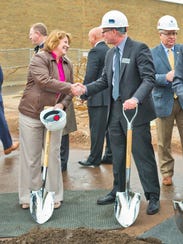 Credit union breaks ground on new digs