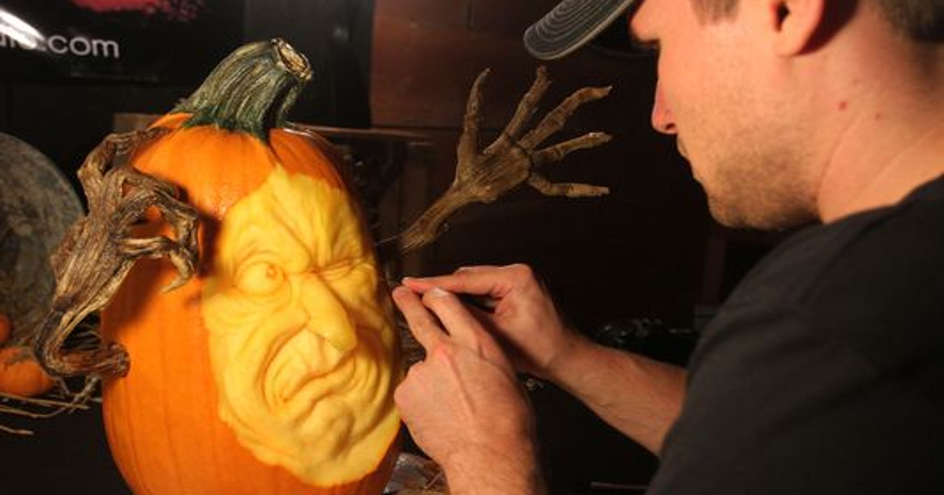Making faces: Twins take pumpkin carving to extreme