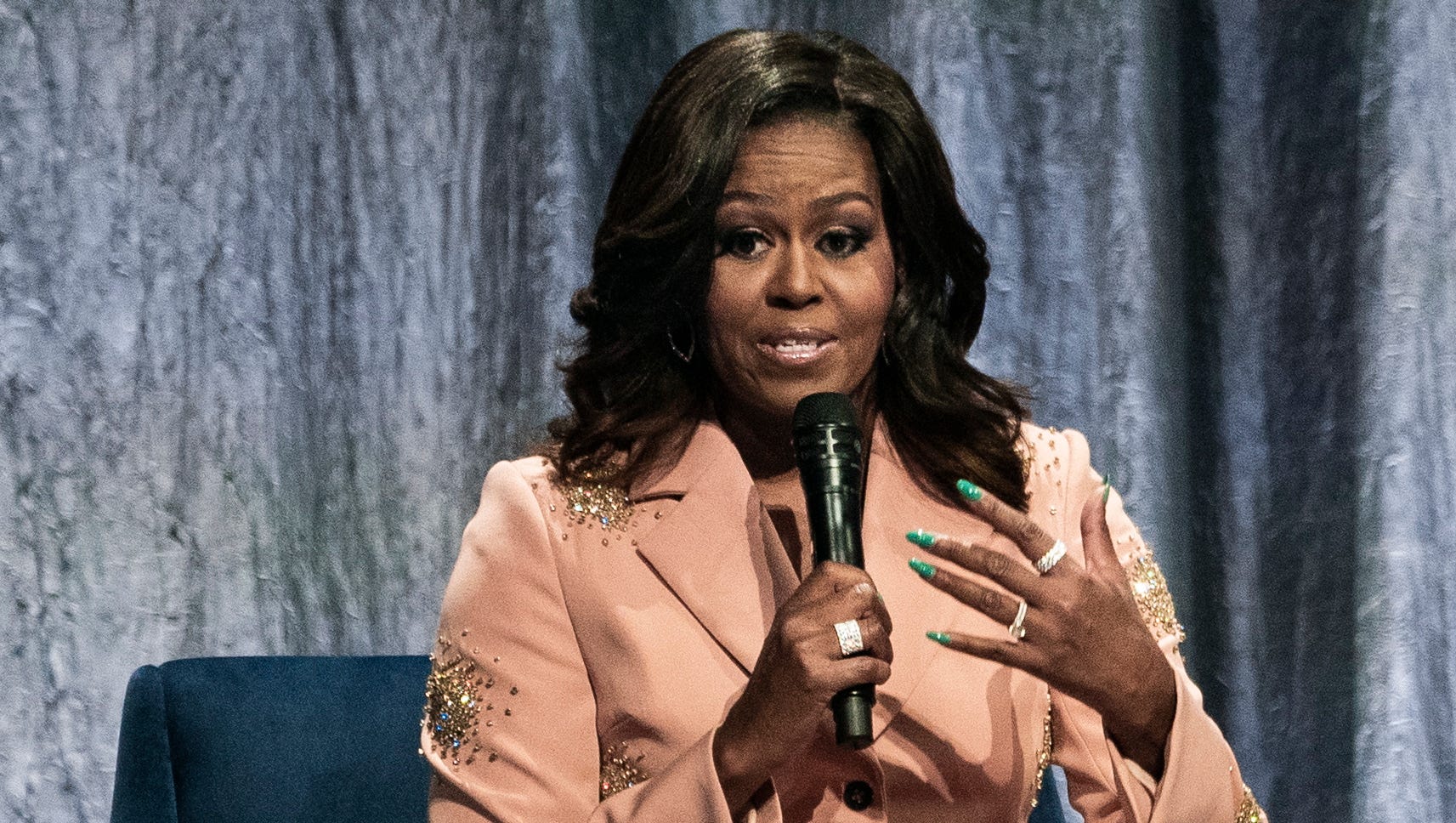 Michelle Obama likens Donald Trump to 'divorced dad,' sparks backlash