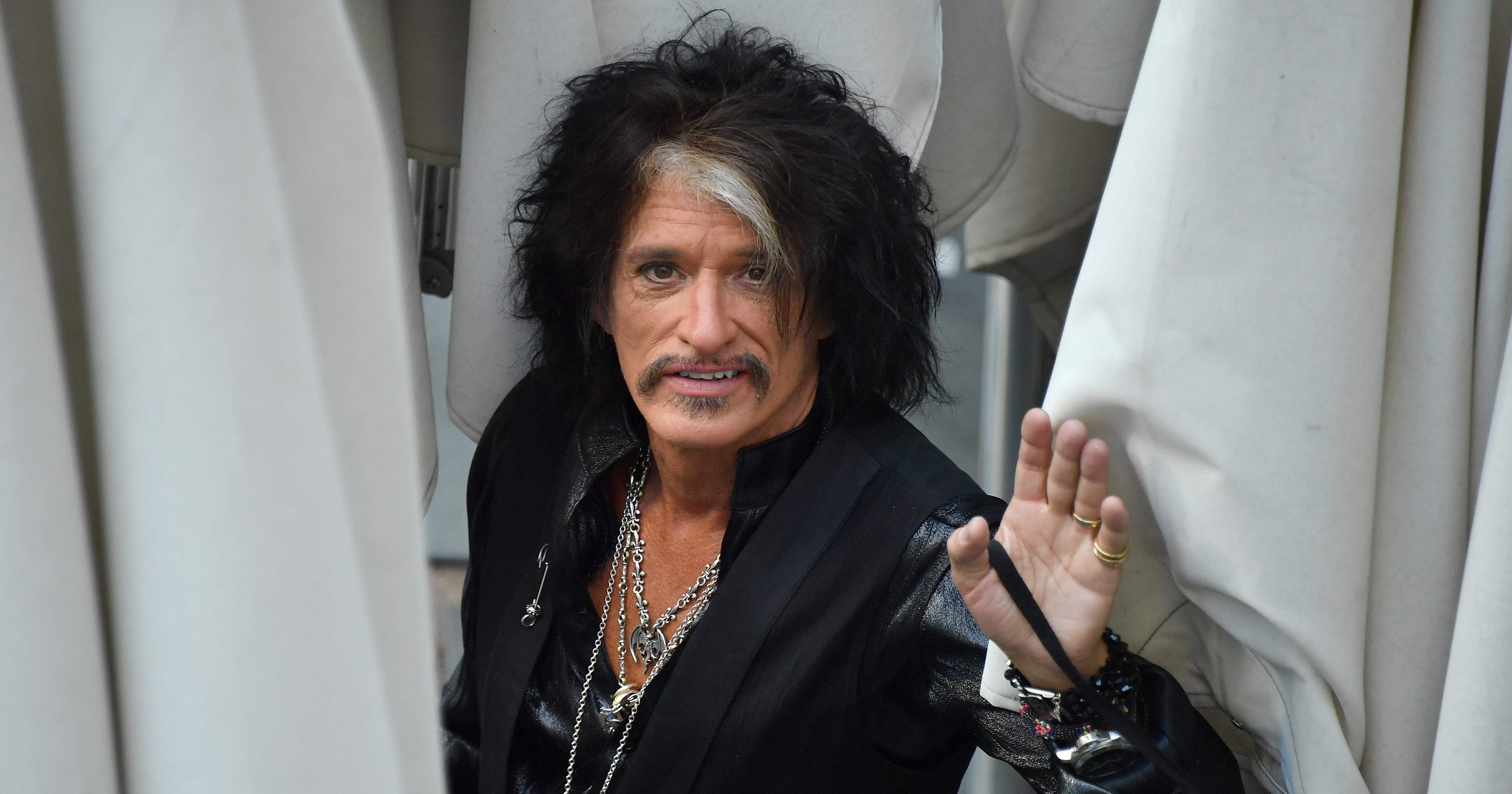 Aerosmith's Joe Perry released from hospital, is 'home and doing well'