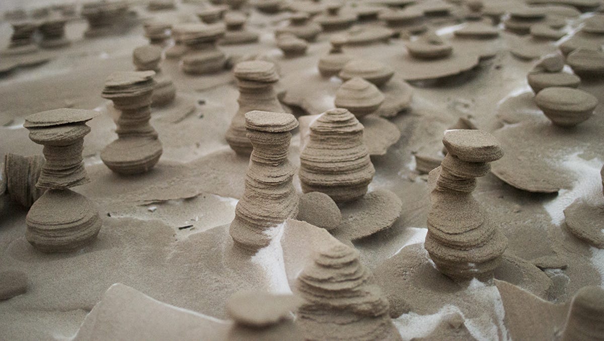 Photographer captures amazing Lake Michigan sand formations