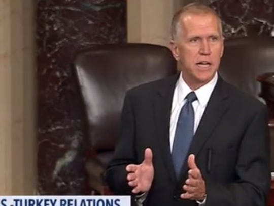 NC GOP Sen. Tillis flips on emergency wall funding, supports Trump