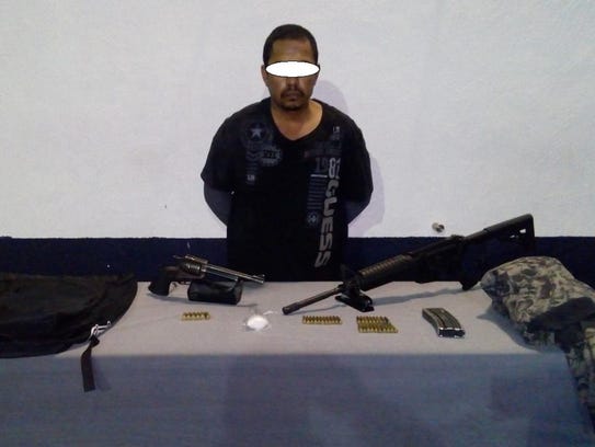 Gang members arrested in killing, firearms case