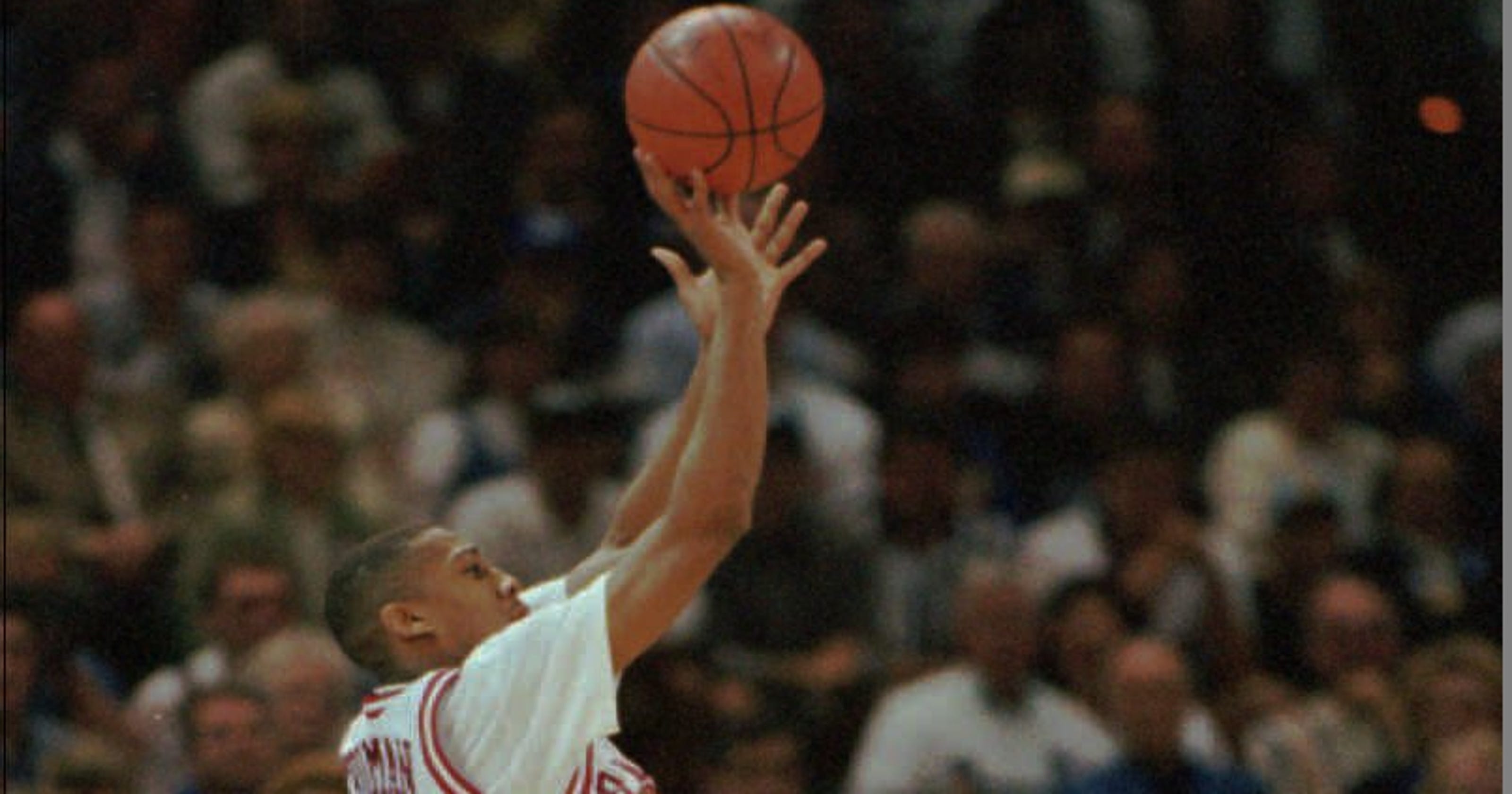 21 years after epic shot, Scotty Thurman helps Arkansas again