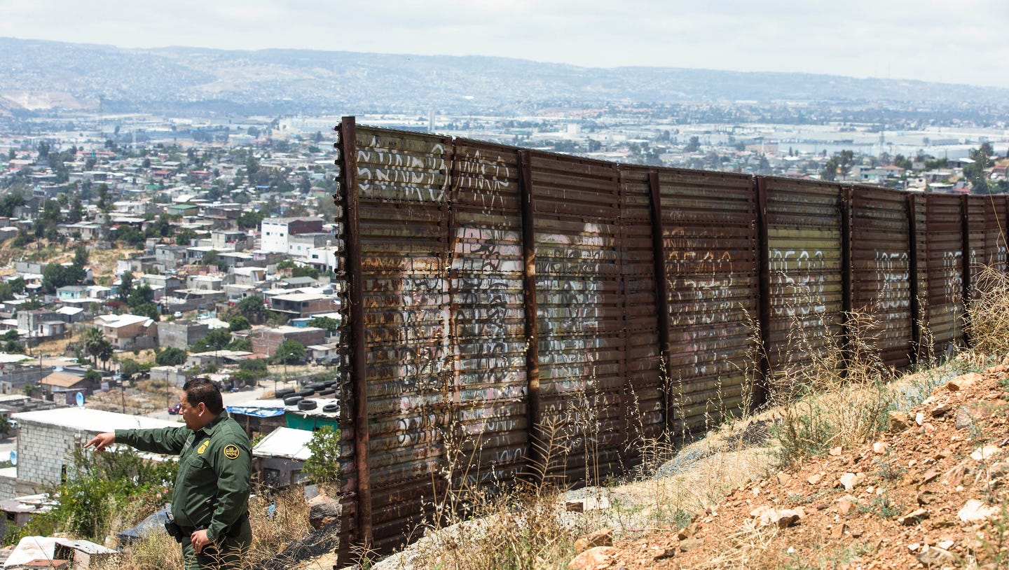 A human smuggler, and the wall that will make him rich