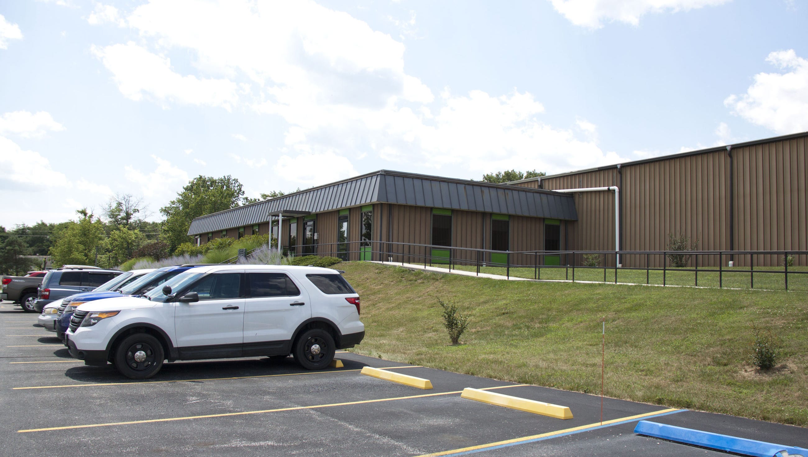 How is Adams Co. funding its $8.1M Human Services building?