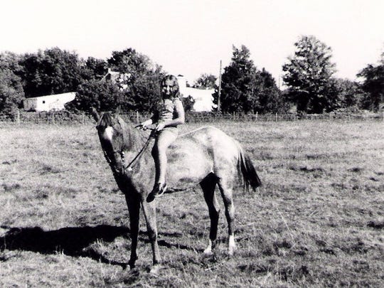 Woman's passion: Photographing Chincoteague ponies