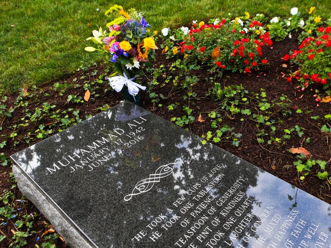 Muhammad Ali's gravesite is at Cave Hill in Louisville. See the photos