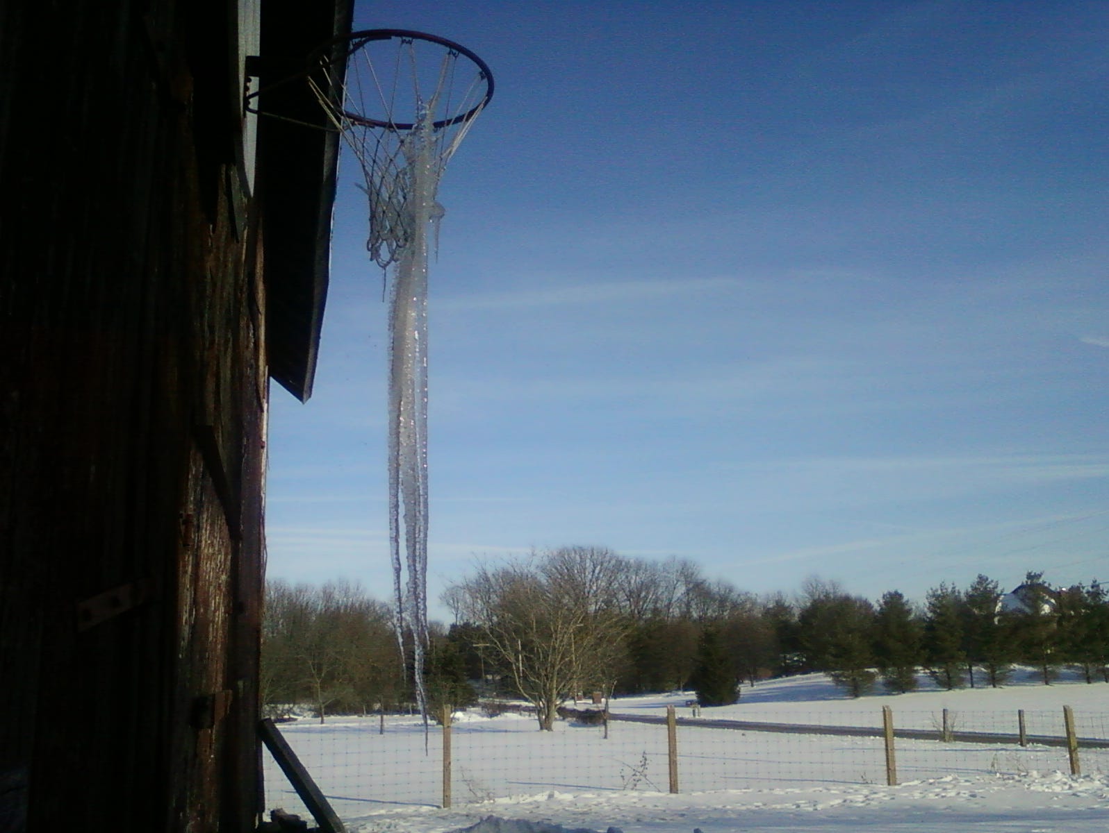 An old barn, a basketball rim, a father, two kids. An Indiana story ...