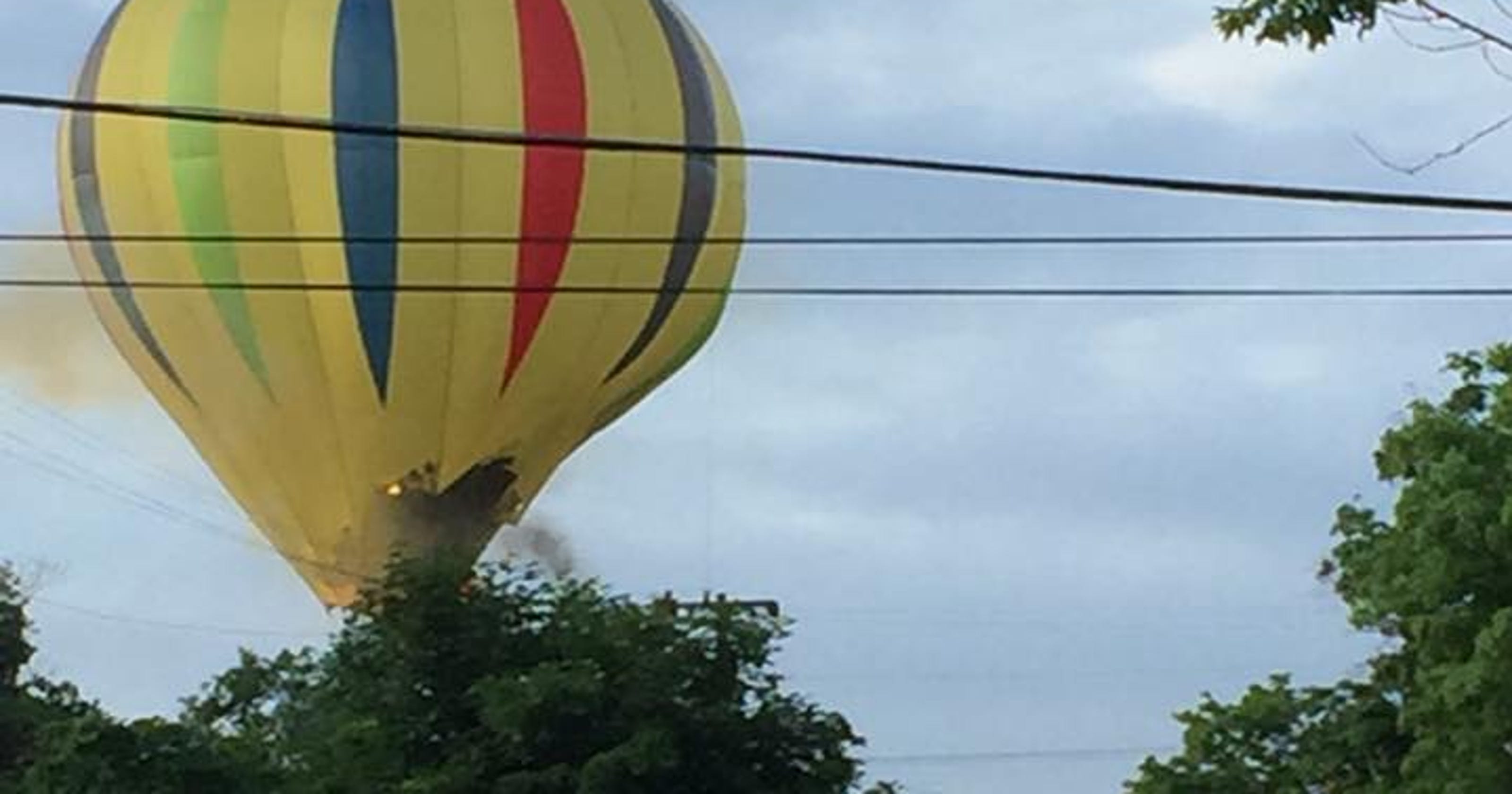 Hot air balloon hits power lines in Livingston County lake