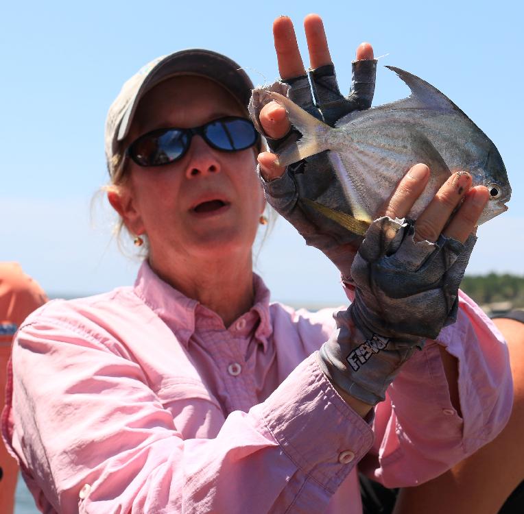 Georgia teachers get muddy, drenched and familiar with fish on trip to ...