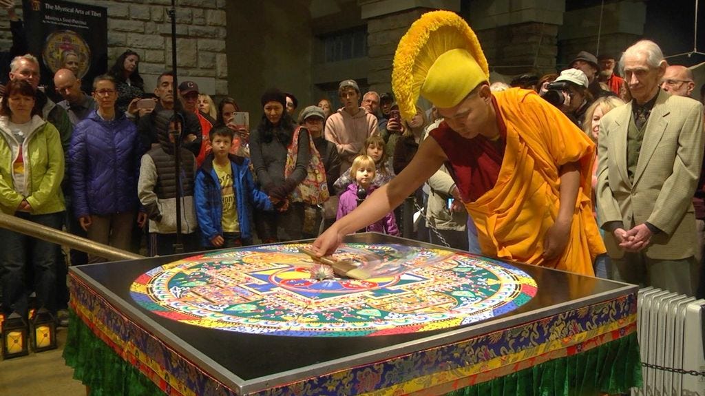 Buddhist monks destroy beautiful sand mandala they created in Dublin