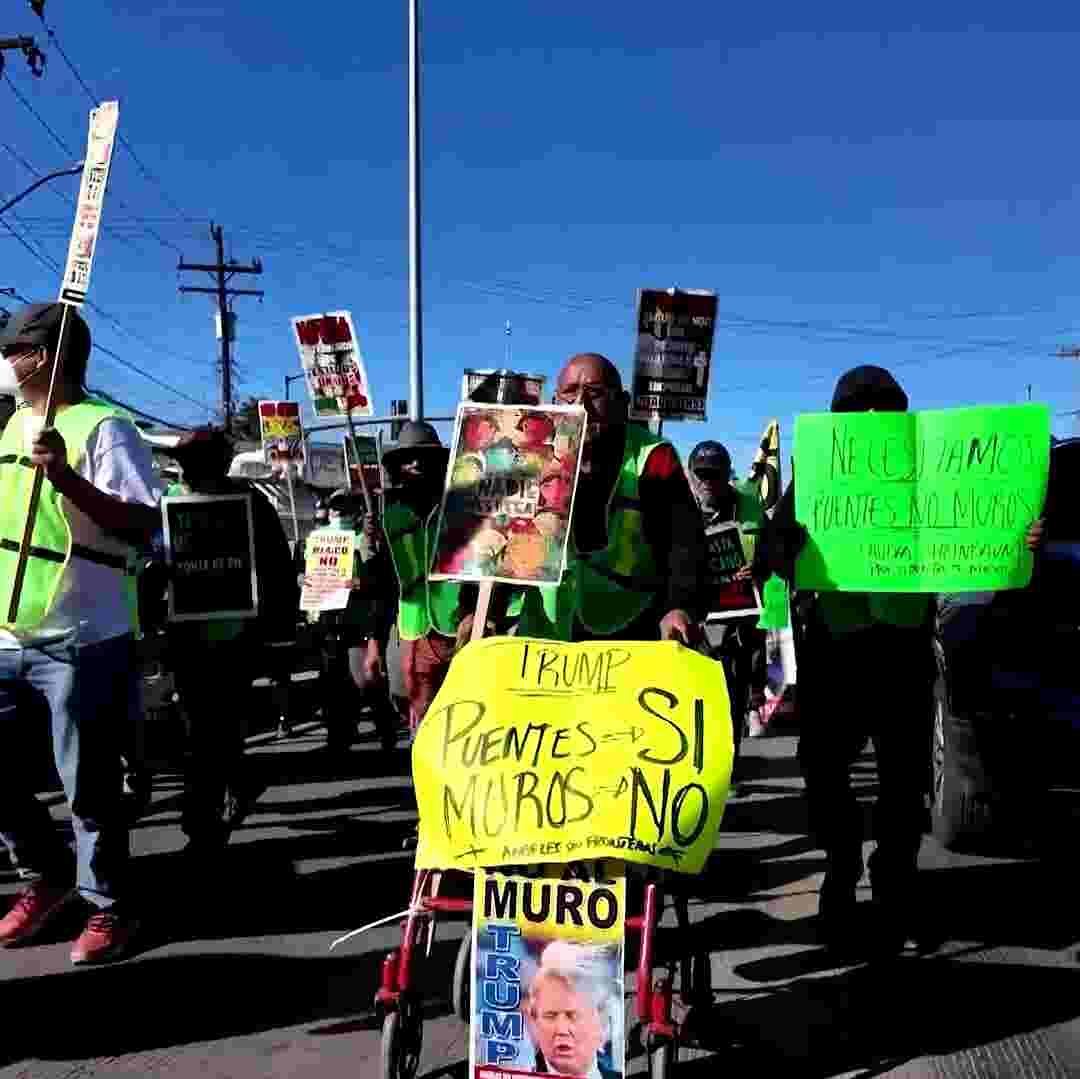 Migrants Activists March At Us Mexico Border On Migrants Day