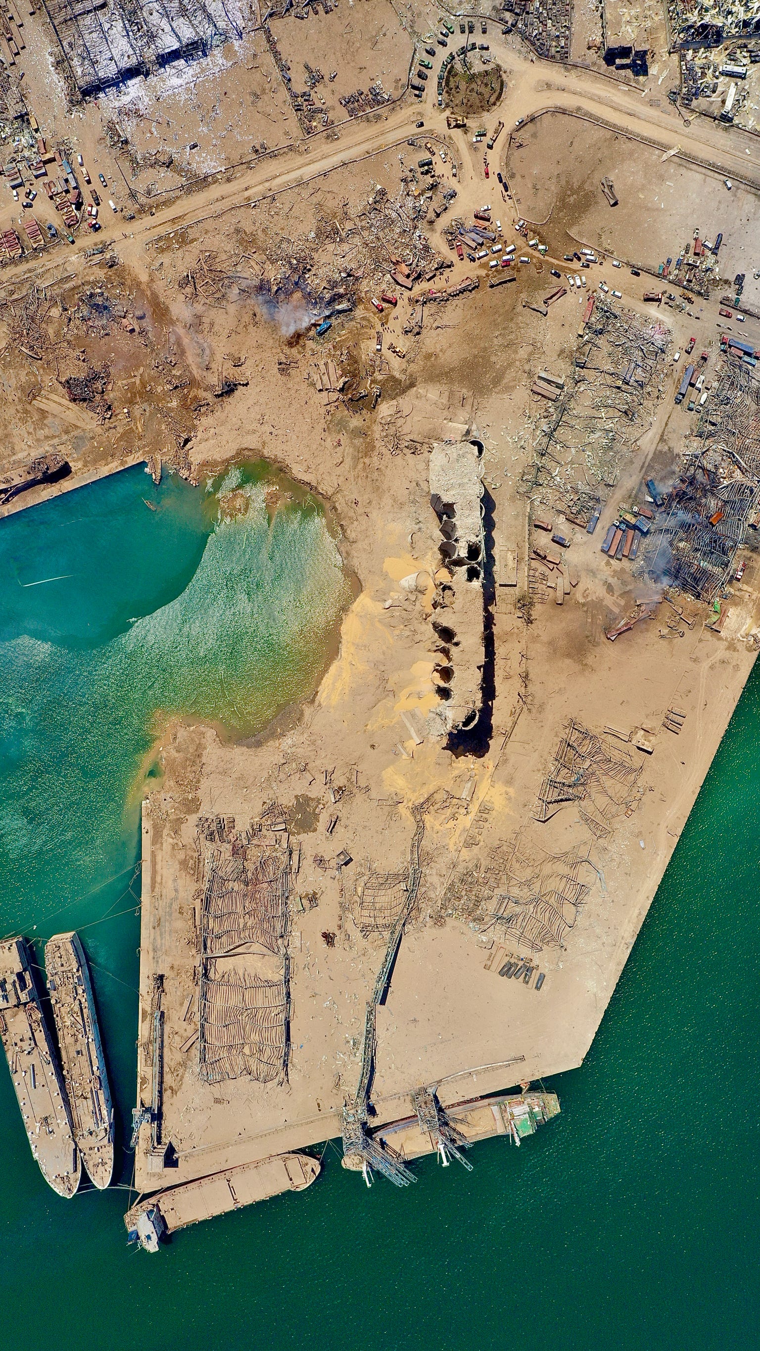 Beirut explosion before and after photos show huge crater from the air