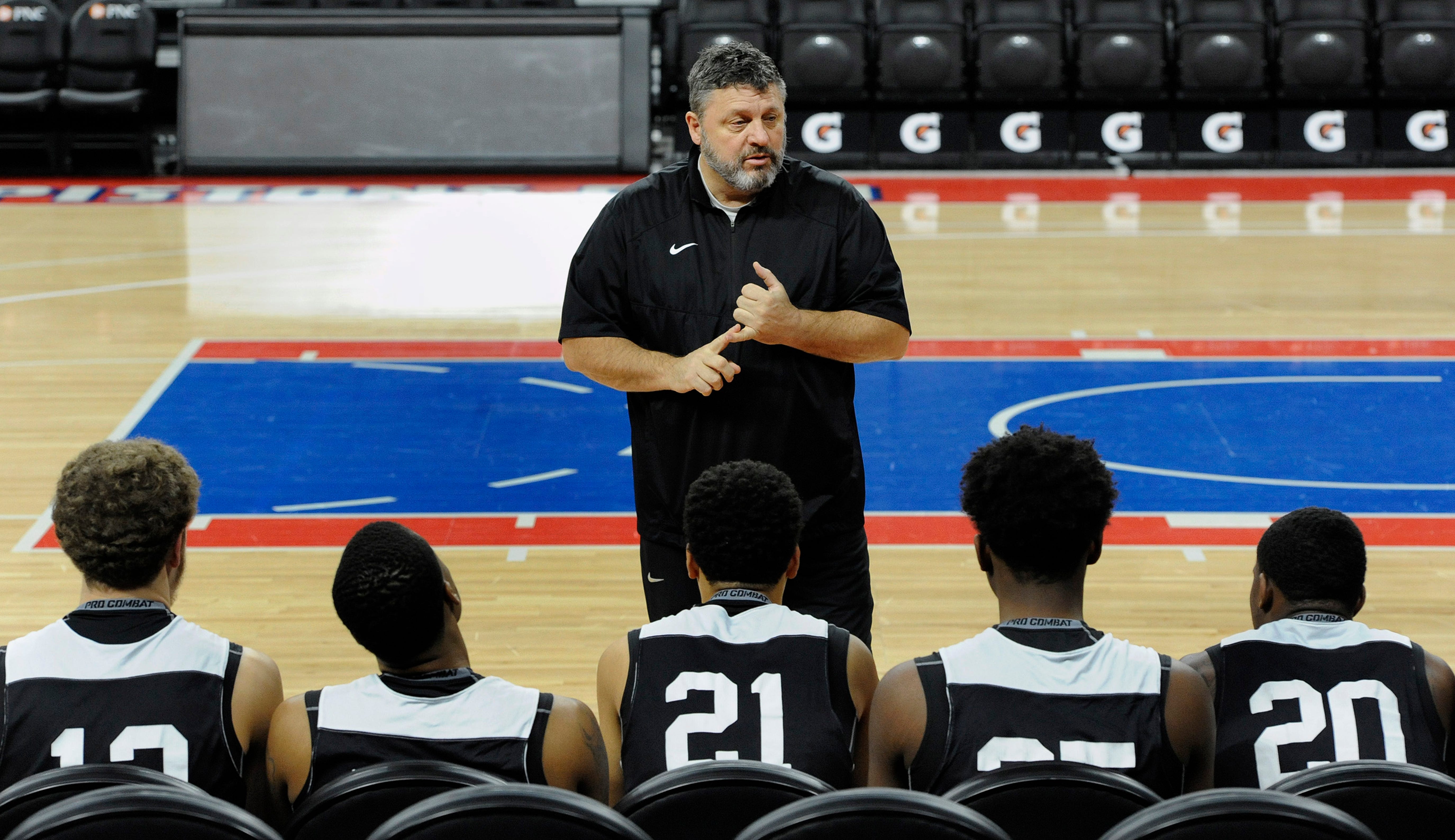 Daily walks help Oakland basketball coach Greg Kampe help others