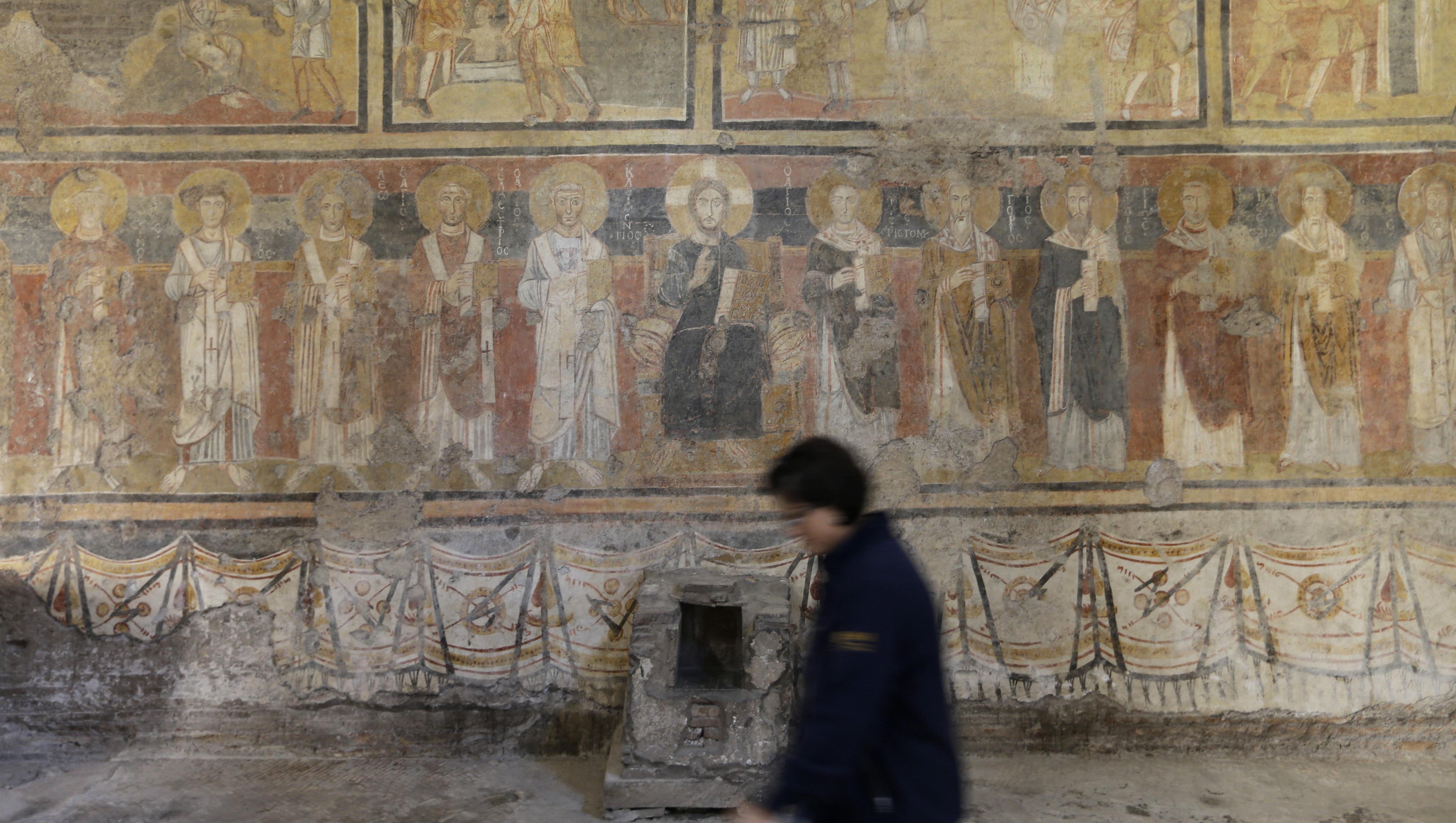 Officials offer rare peek of ancient frescoes