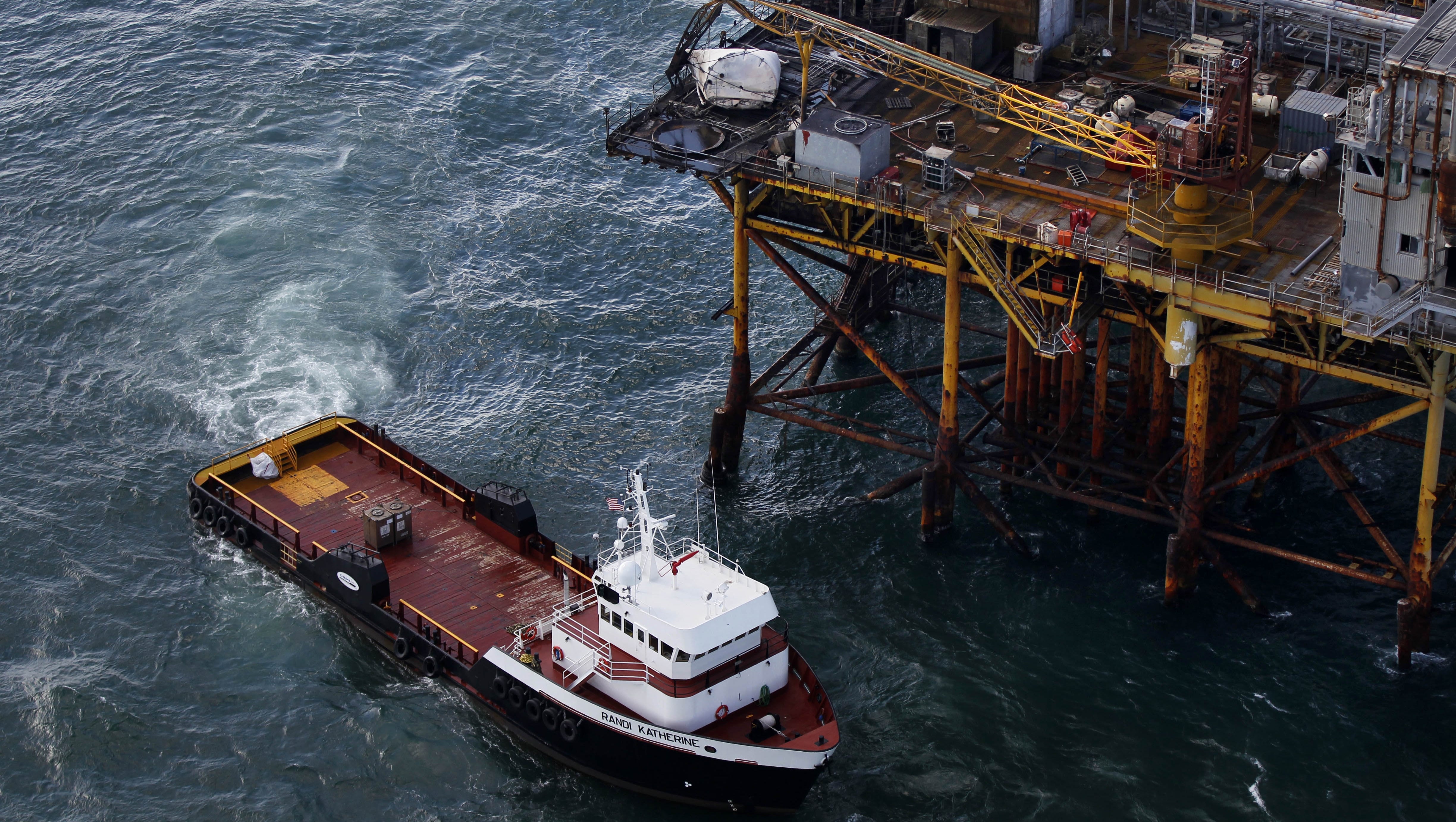 Company vows continued search near burned Gulf rig