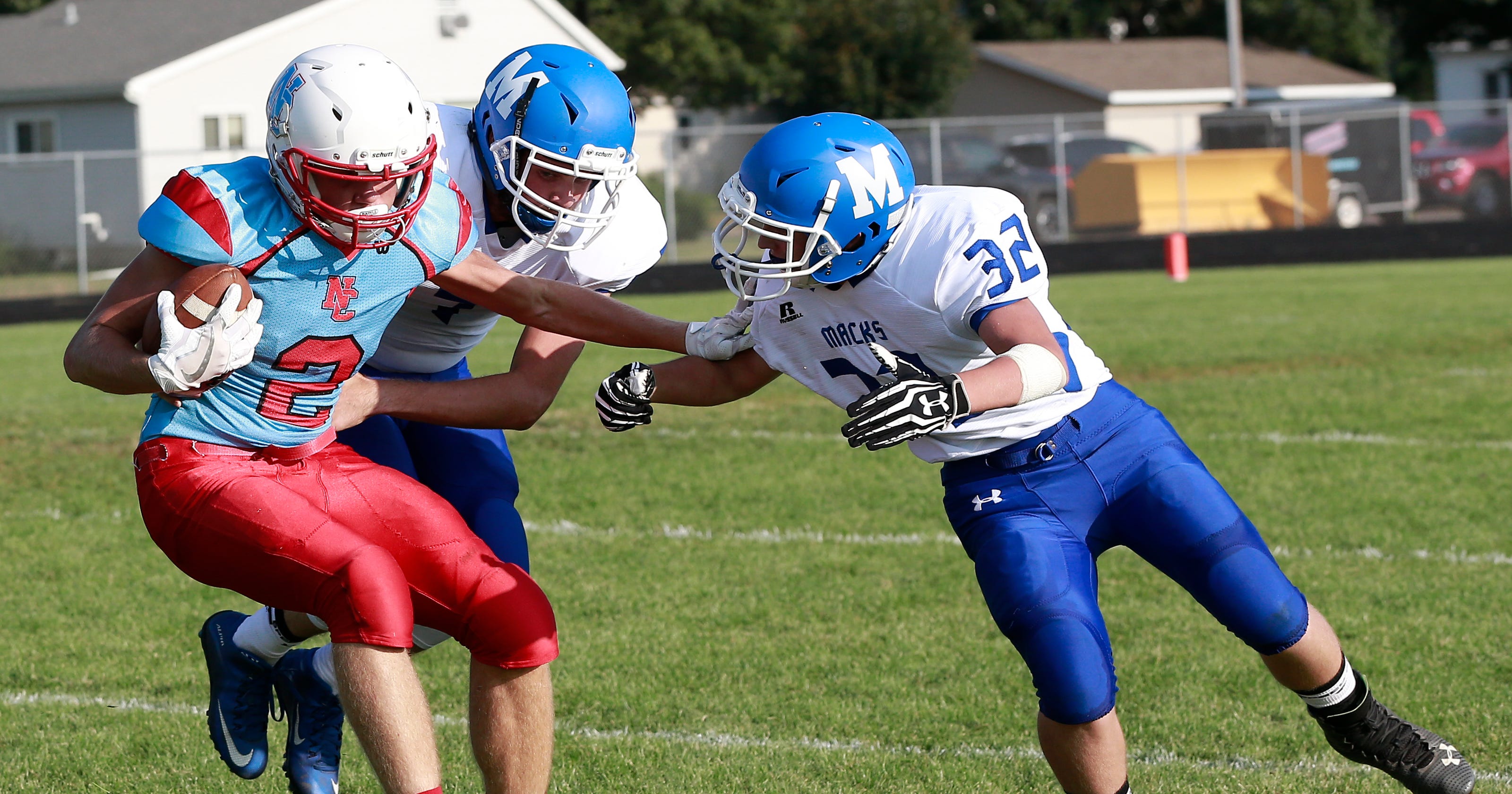High school football: Newman Catholic rides big first half to win