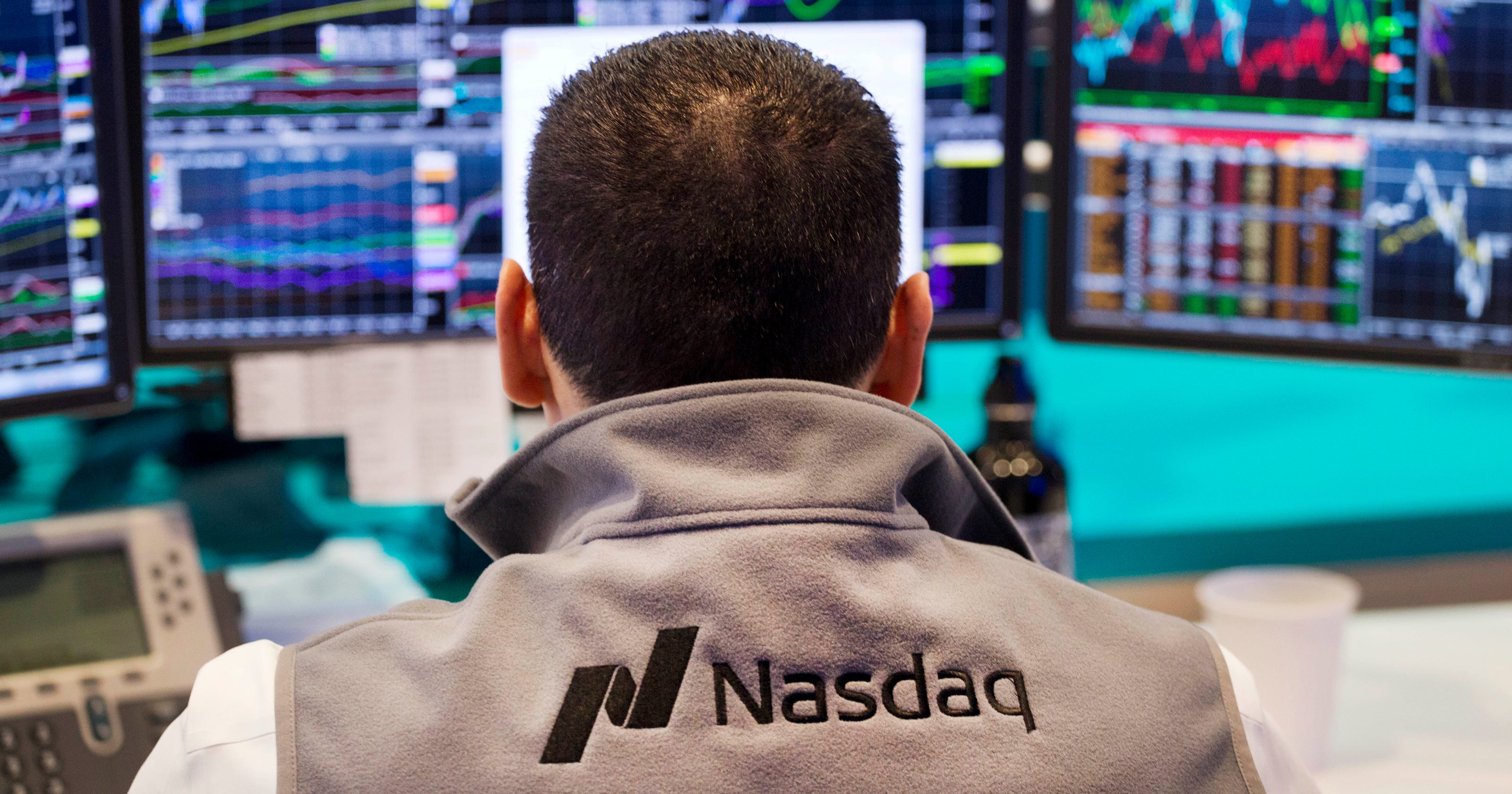 nasdaq-tops-8-000-milestone-with-help-from-apple-amazon-and-netflix