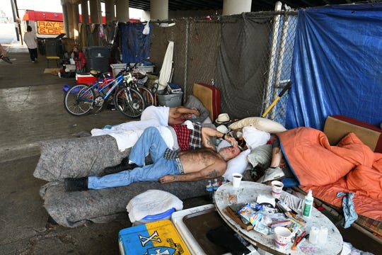 Homelessness in Knoxville: Mixed reactions to Broadway overpass day park