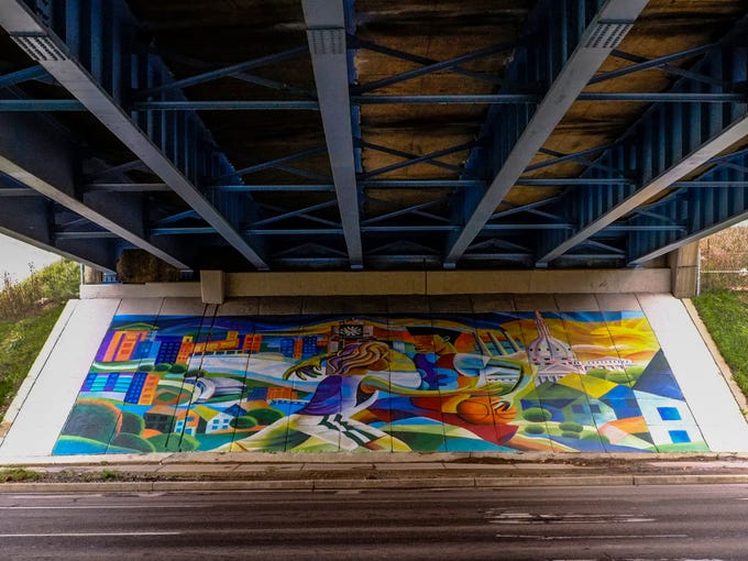 The stories and artists behind Lansing’s murals