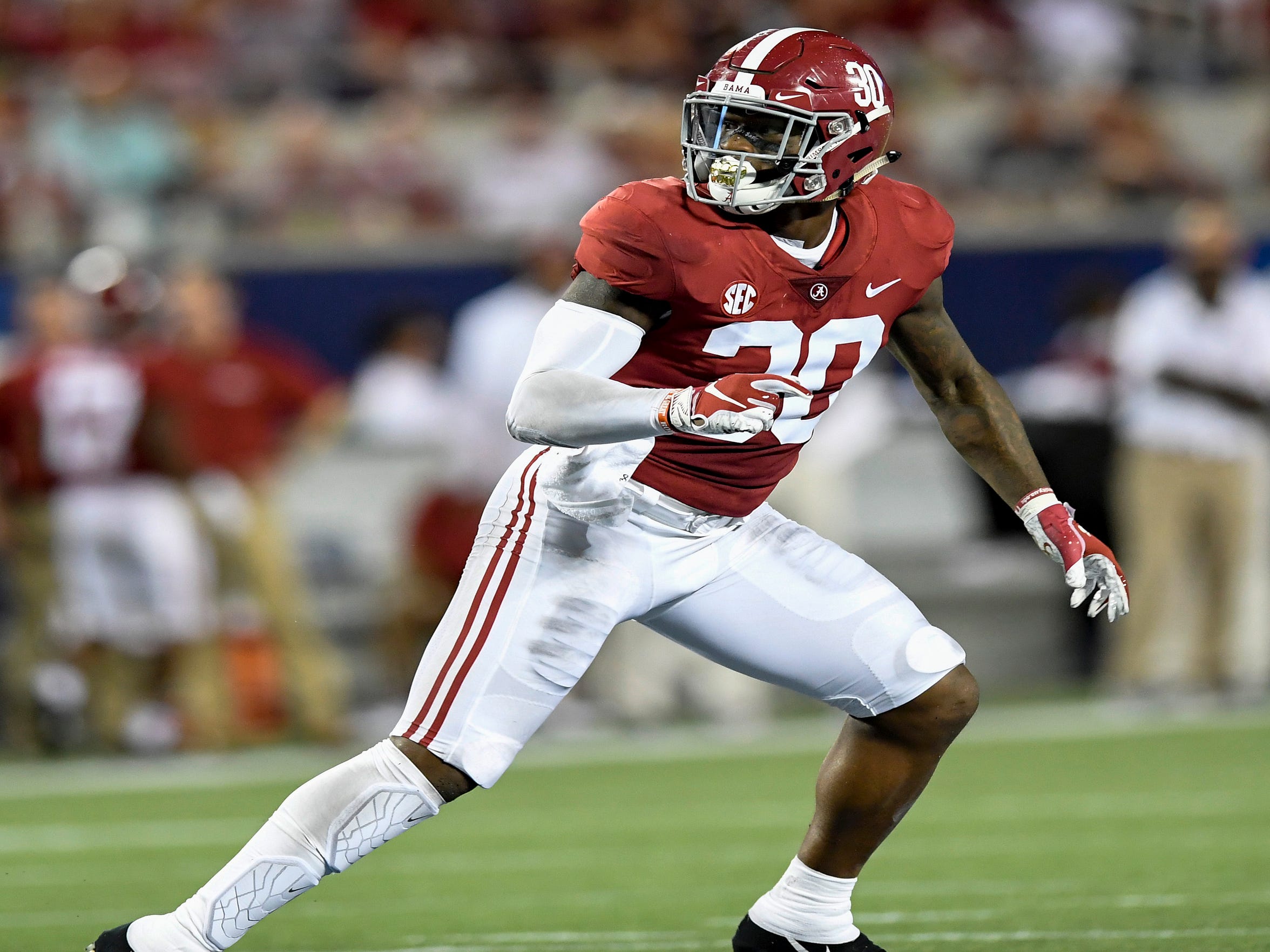 Tide LB Mack Wilson honors fallen hometown friends with tattoo tribute