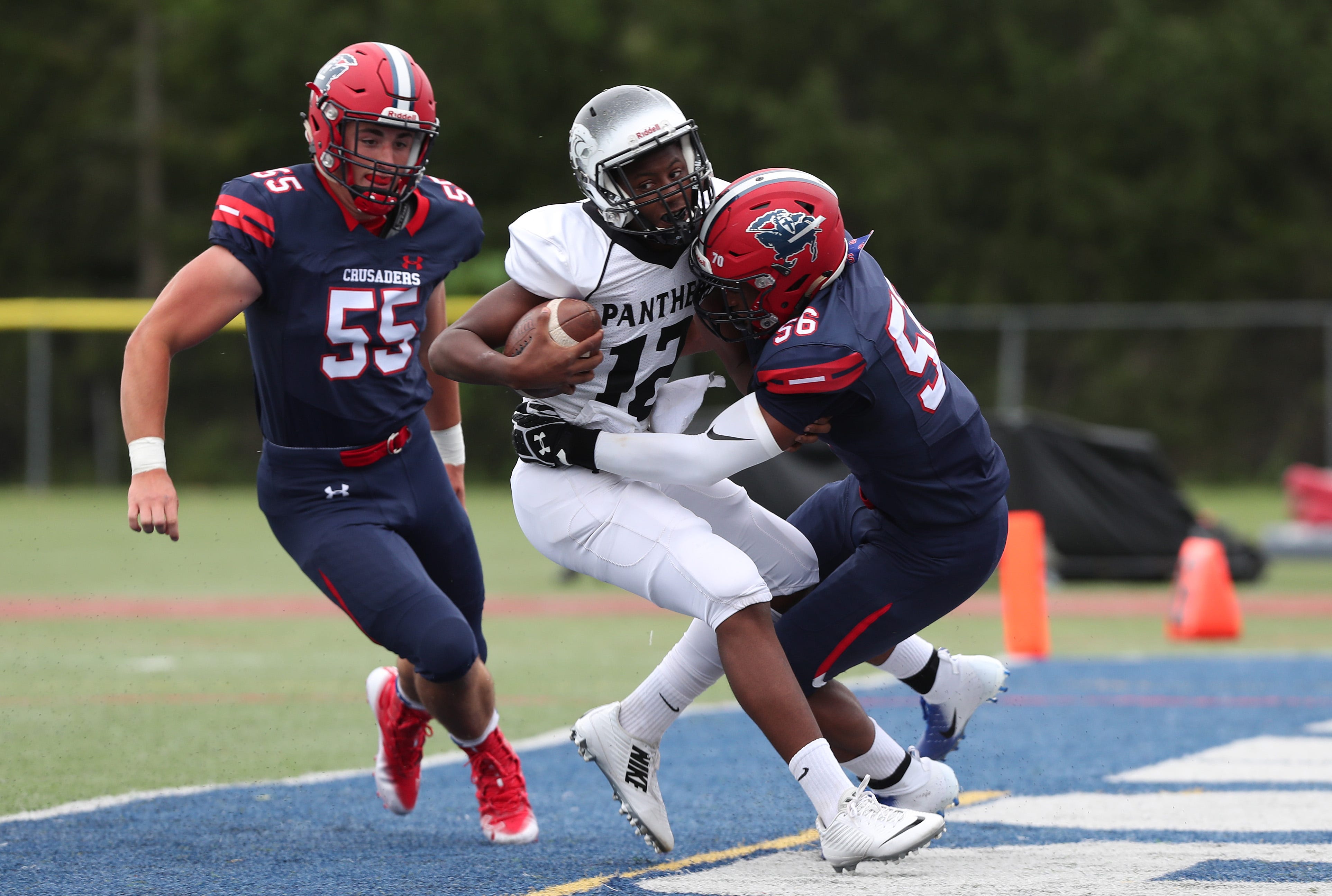 Football: Stepinac's eight sacks lead dominant defensive effort