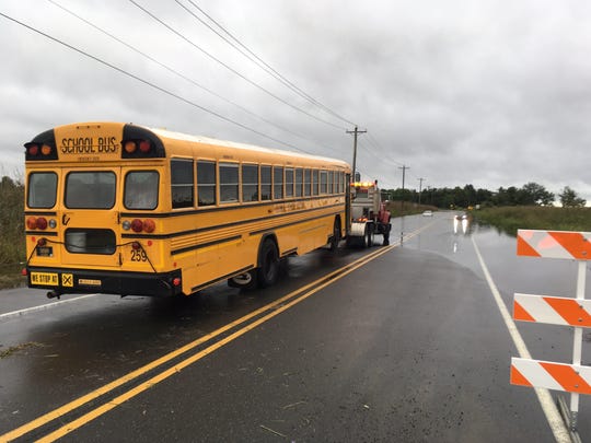 Bus with 45 students caught in flood waters on Route 9