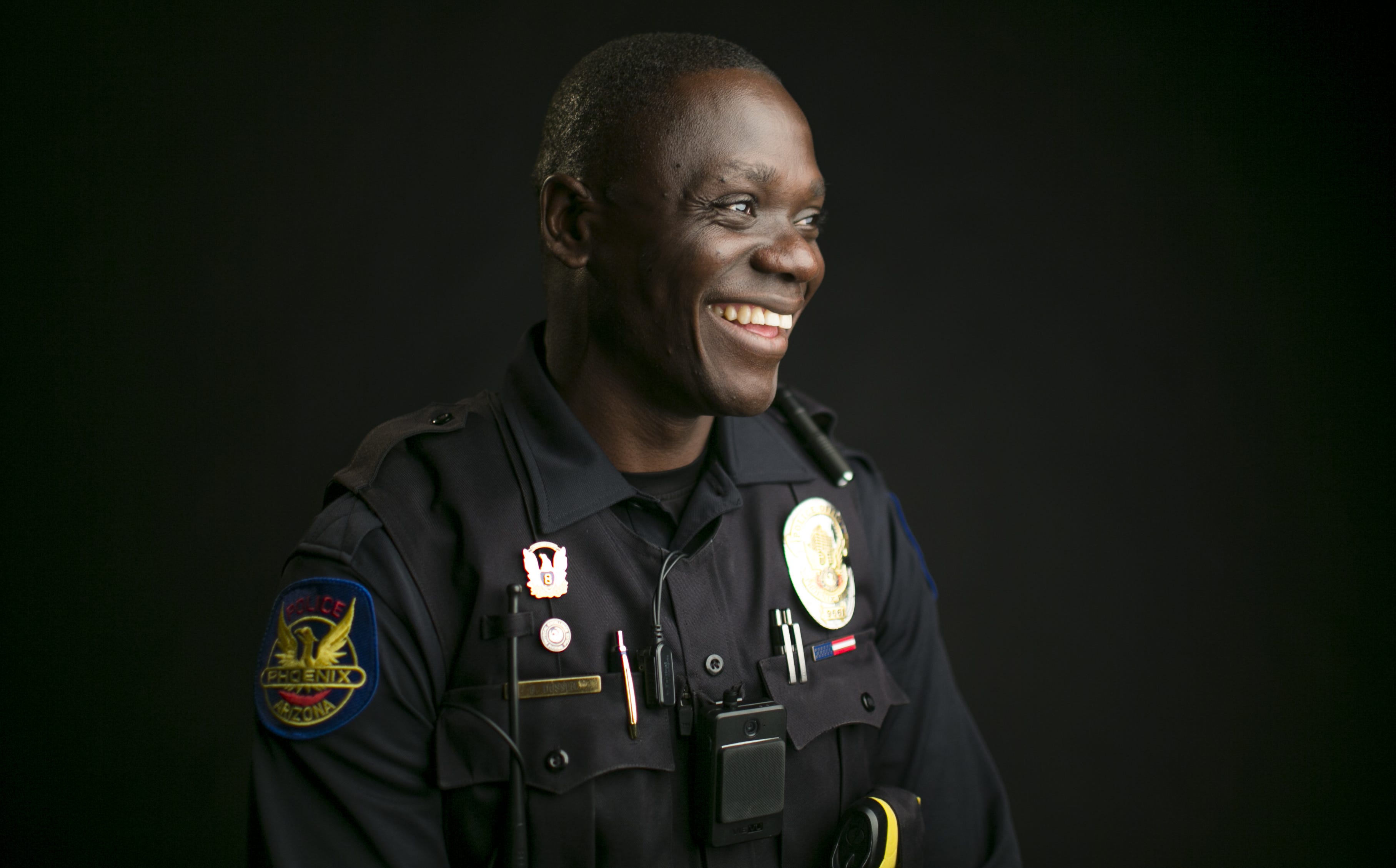 Once a refugee, Phoenix police officer breaks down immigration stigma