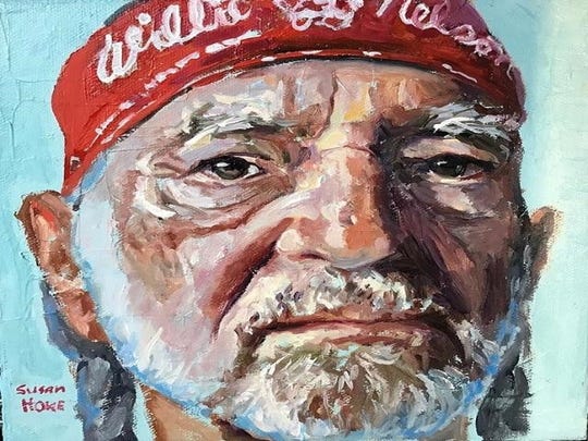 Revelry Boutique Gallery features Susan Howe's 100 faces art