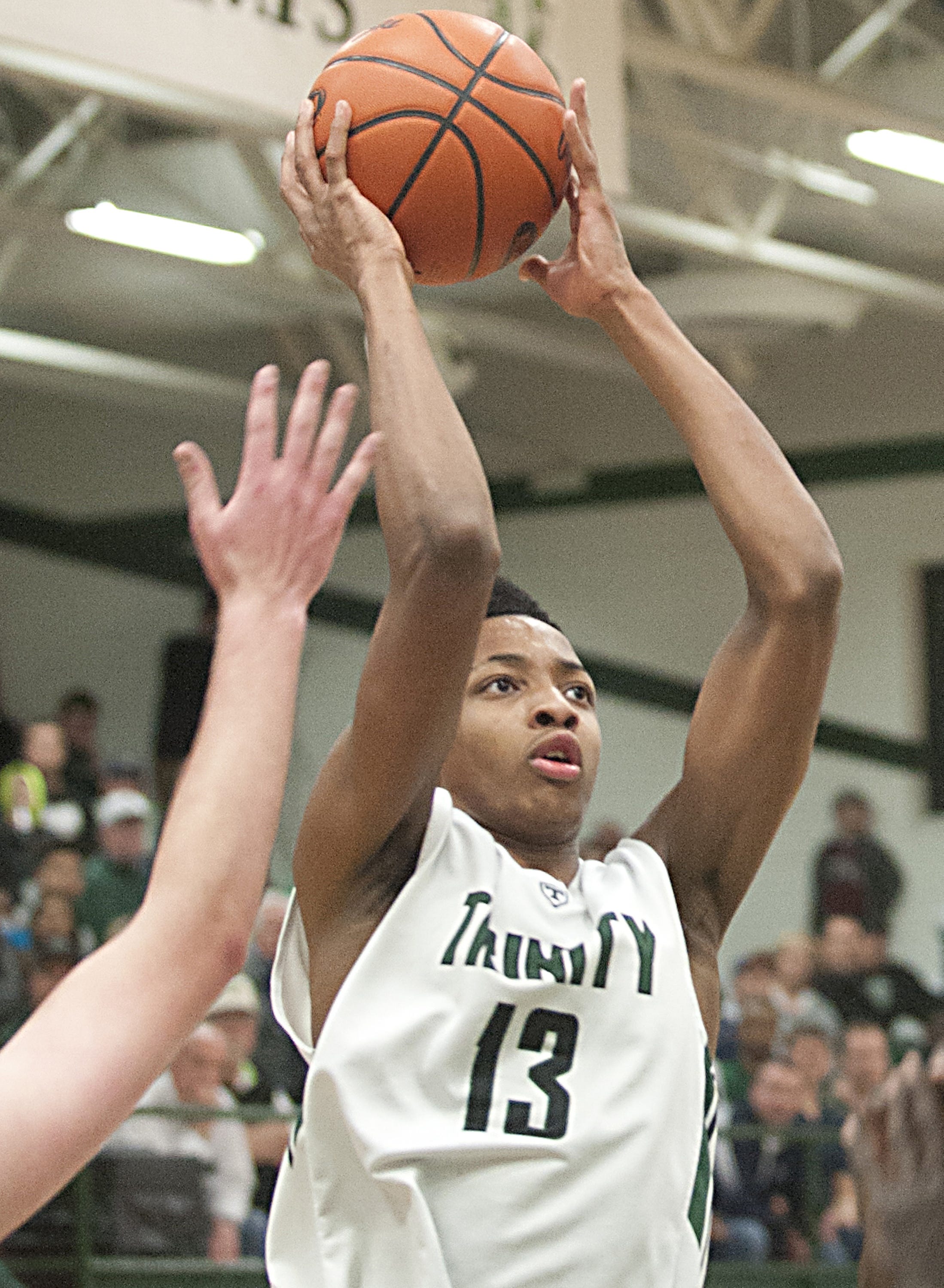 Stronger David Johnson looking to lead Trinity and Mr. Basketball race