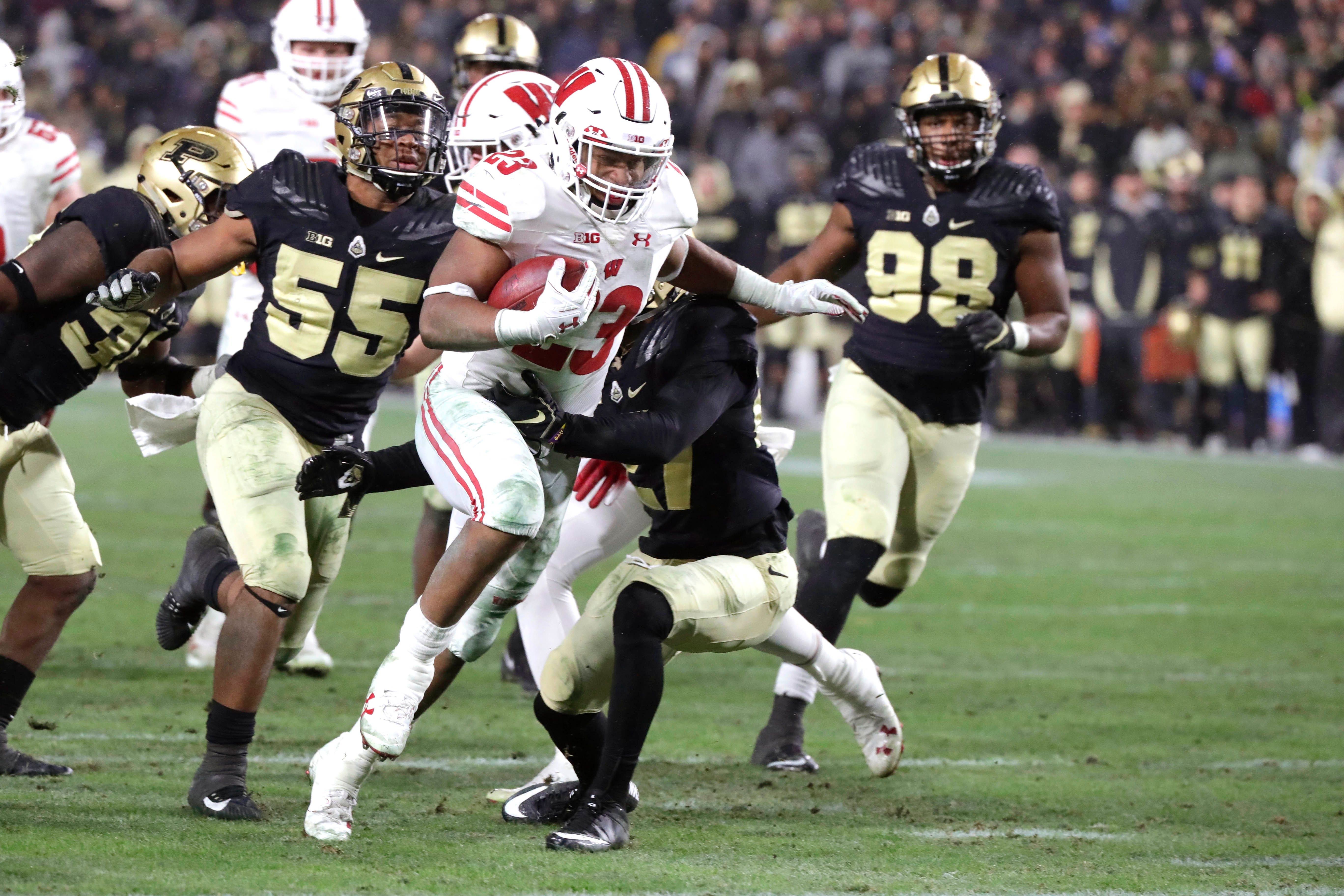Jonathan Taylor lifts UW over Purdue in three overtimes