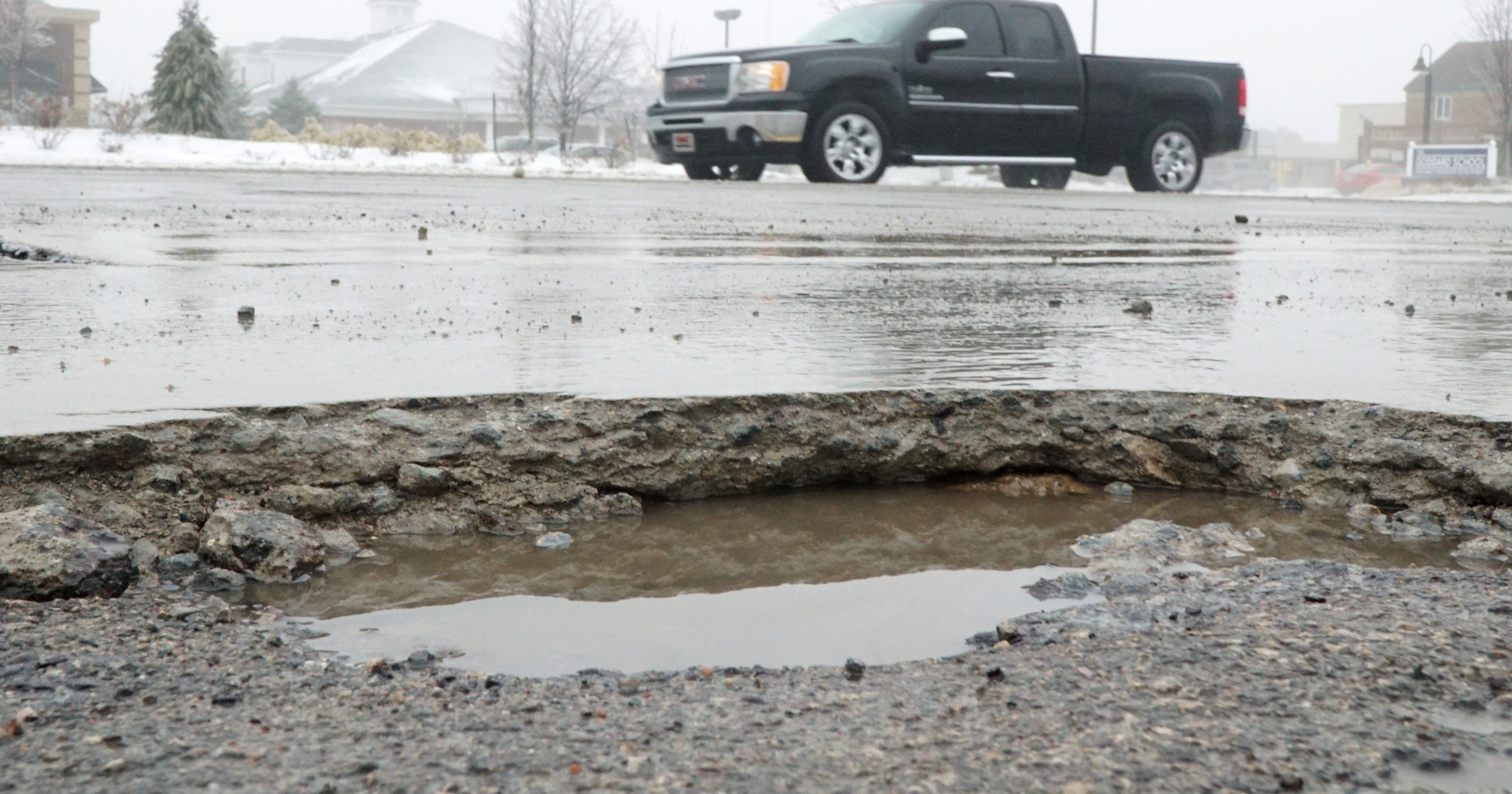 Metro Detroit Pothole reporting advice: call 1-888-762-3273