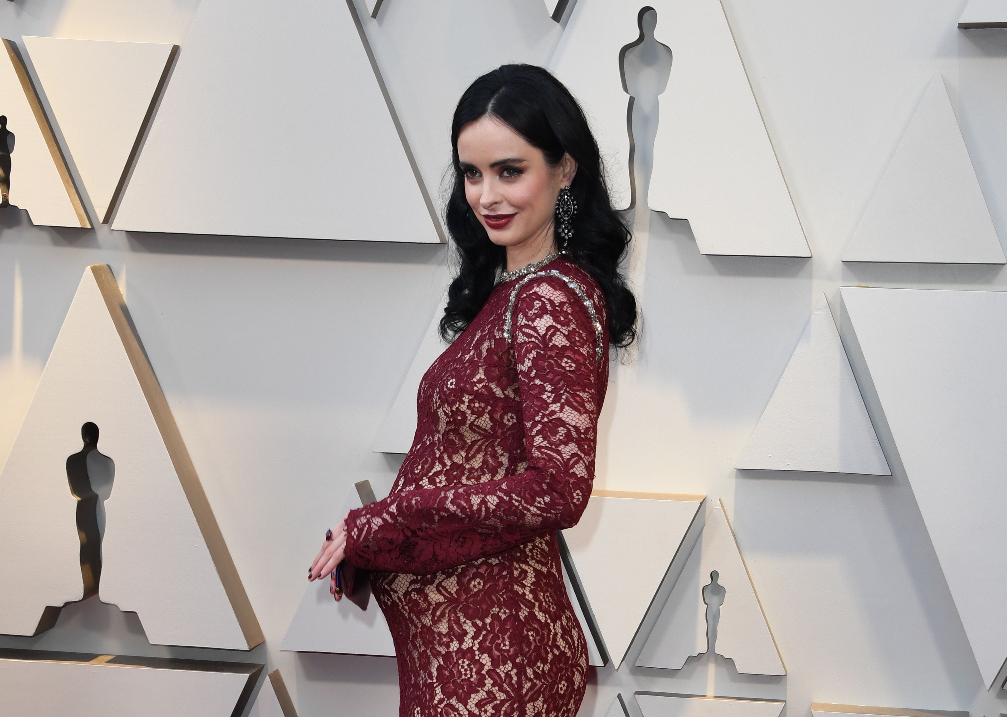 Krysten Ritter reveals pregnancy on Oscars red carpet