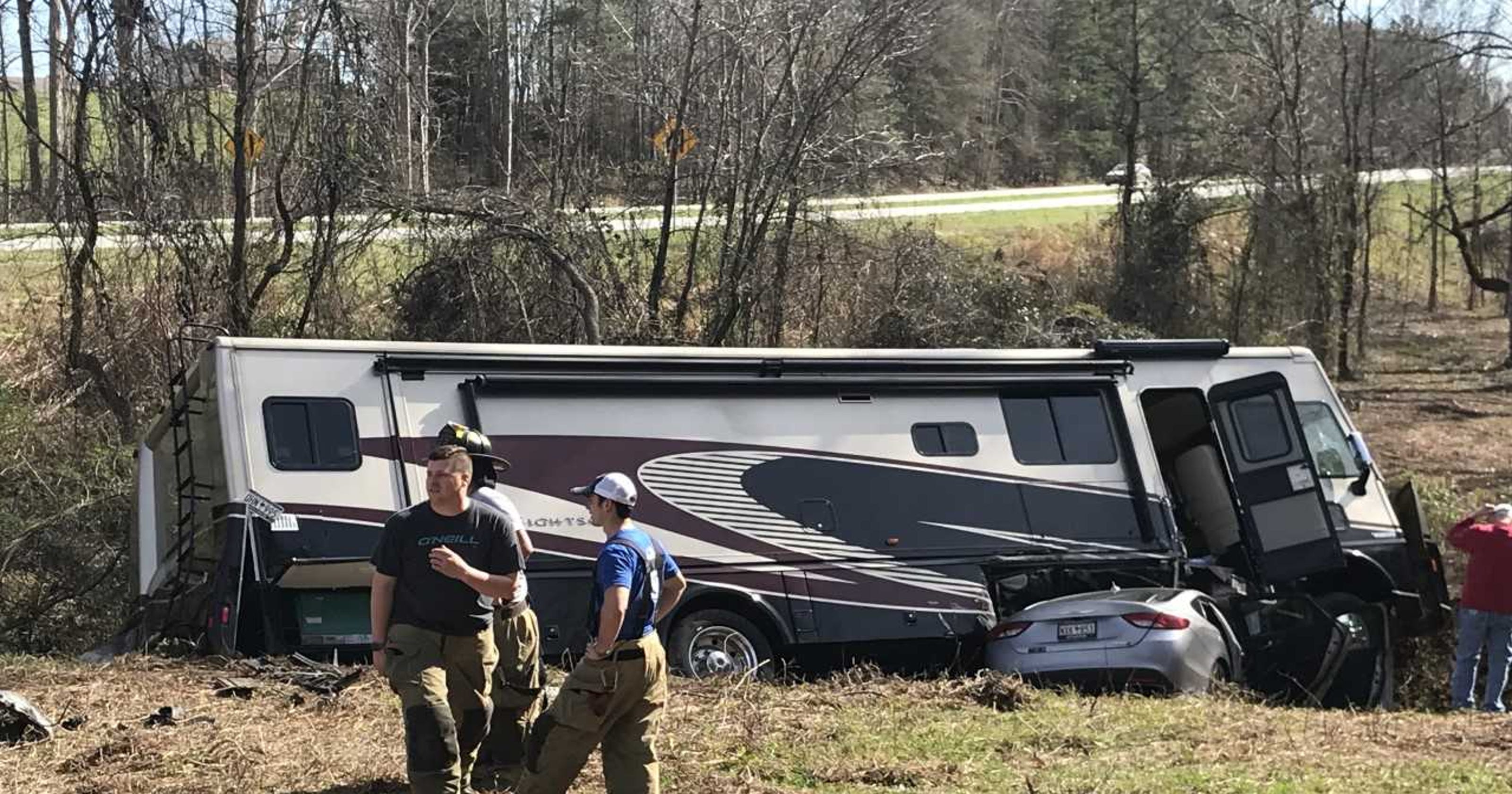RV lands on top of car; drivers survive crash