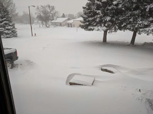 How much snow has fallen in South Dakota so far during the April storm