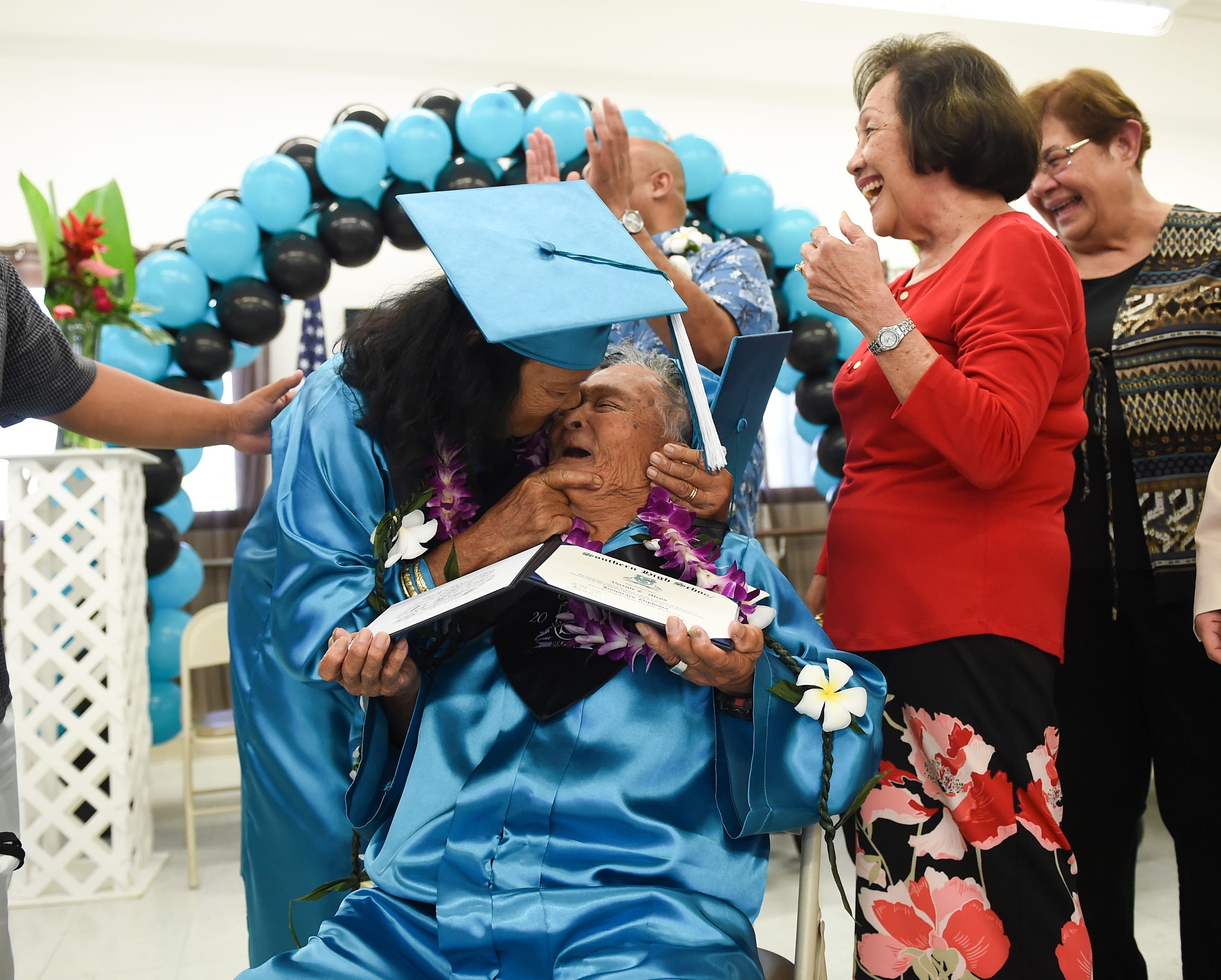 Inarajan couple celebrates another milestone with honorary diplomas