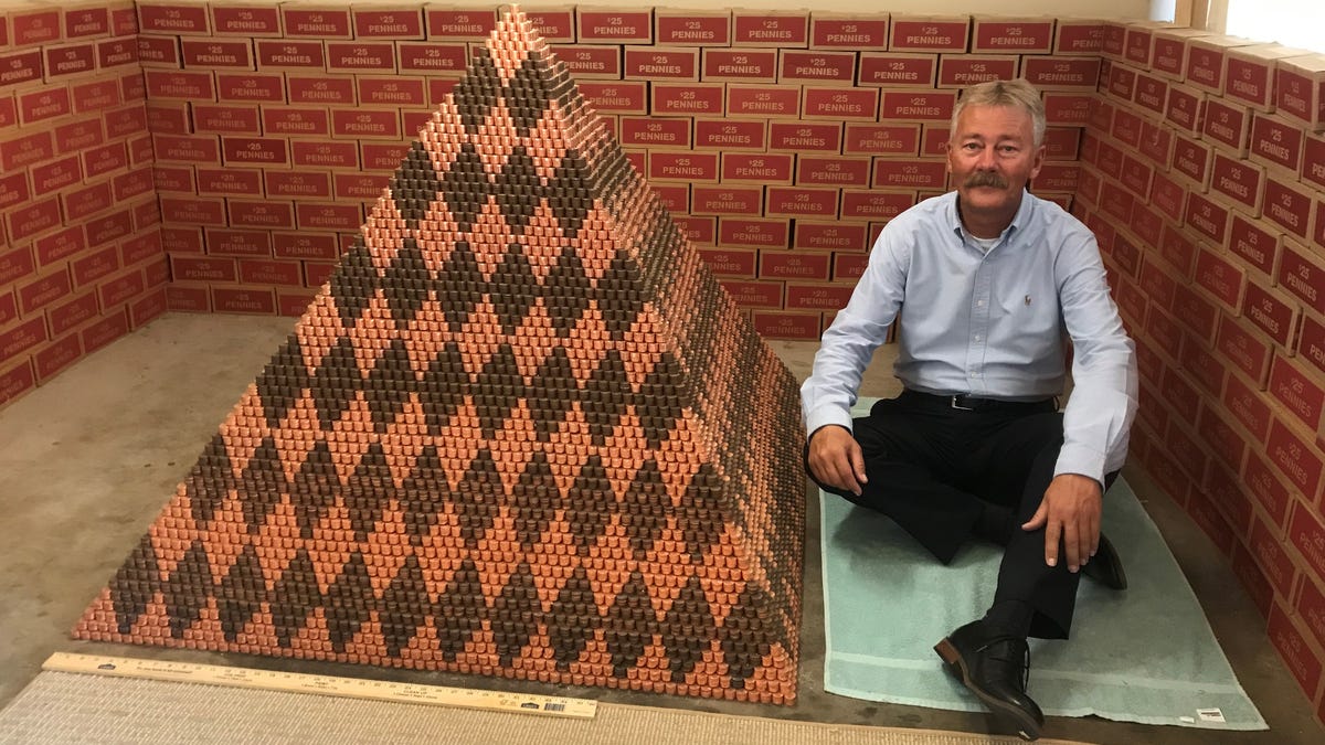 Phoenix YouTuber breaks world record building pyramid made with coins