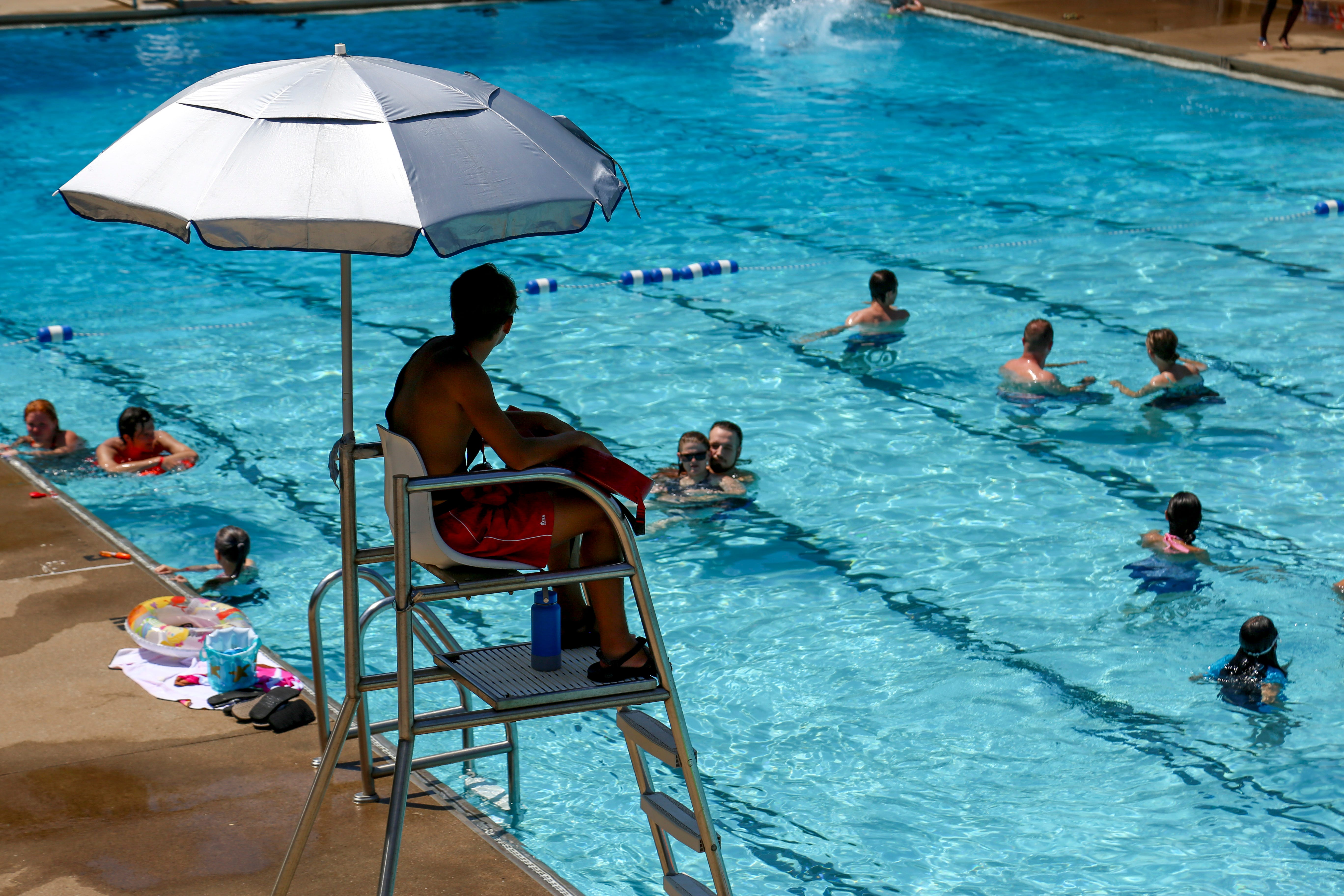 Amid lifeguard shortage swimming pools scramble to adjust hours