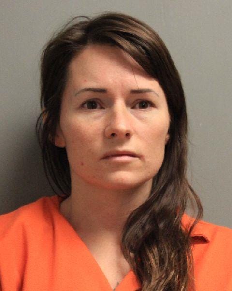 Woman accused in fatal Walmart shooting files lawsuit over halted payments