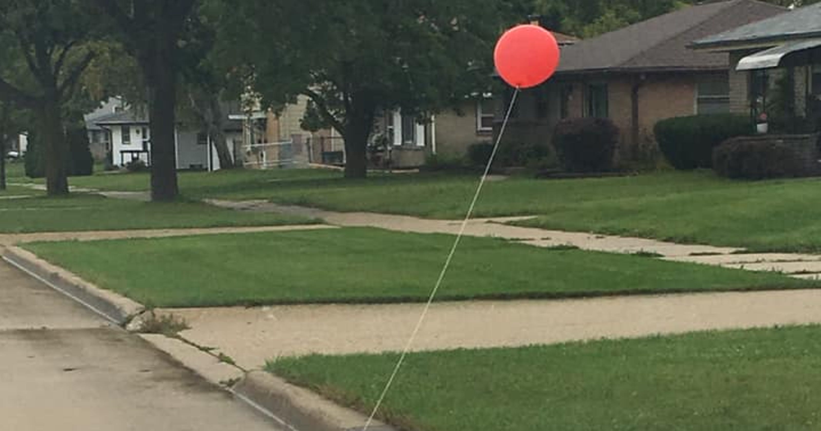 'IT'-inspired red balloons found tied to sewer grates in Cudahy