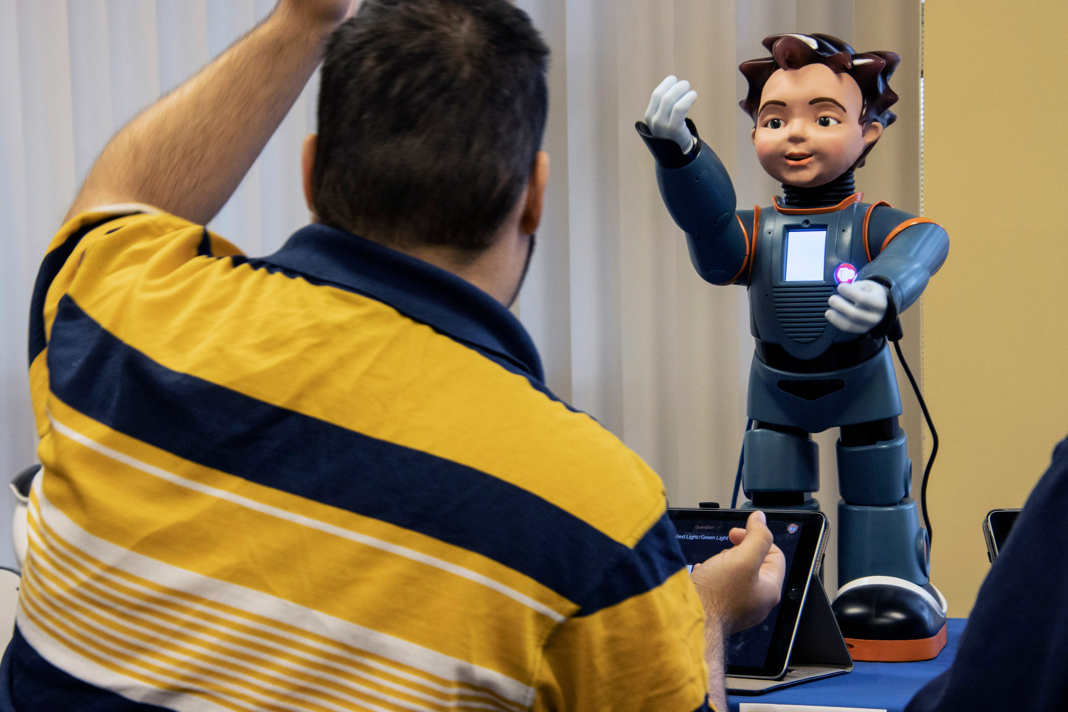 Autism patients are using robots to learn communication skills