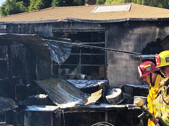 Crews put out sheds on fire in backyard of Ventura home