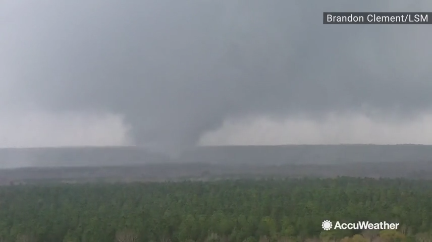 Drone video shows stovepipe tornado roaring over trees in Mississippi